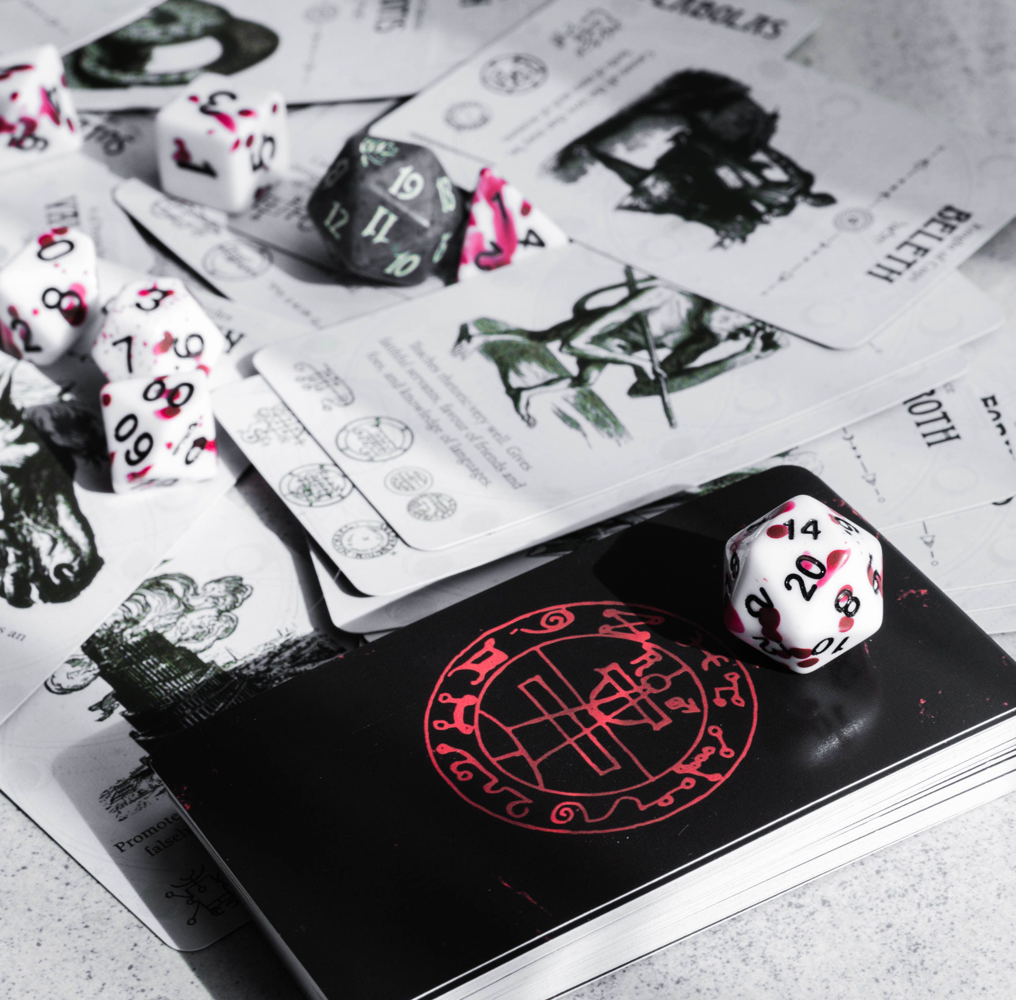 A set of dice and cards on a table · Free Stock Photo