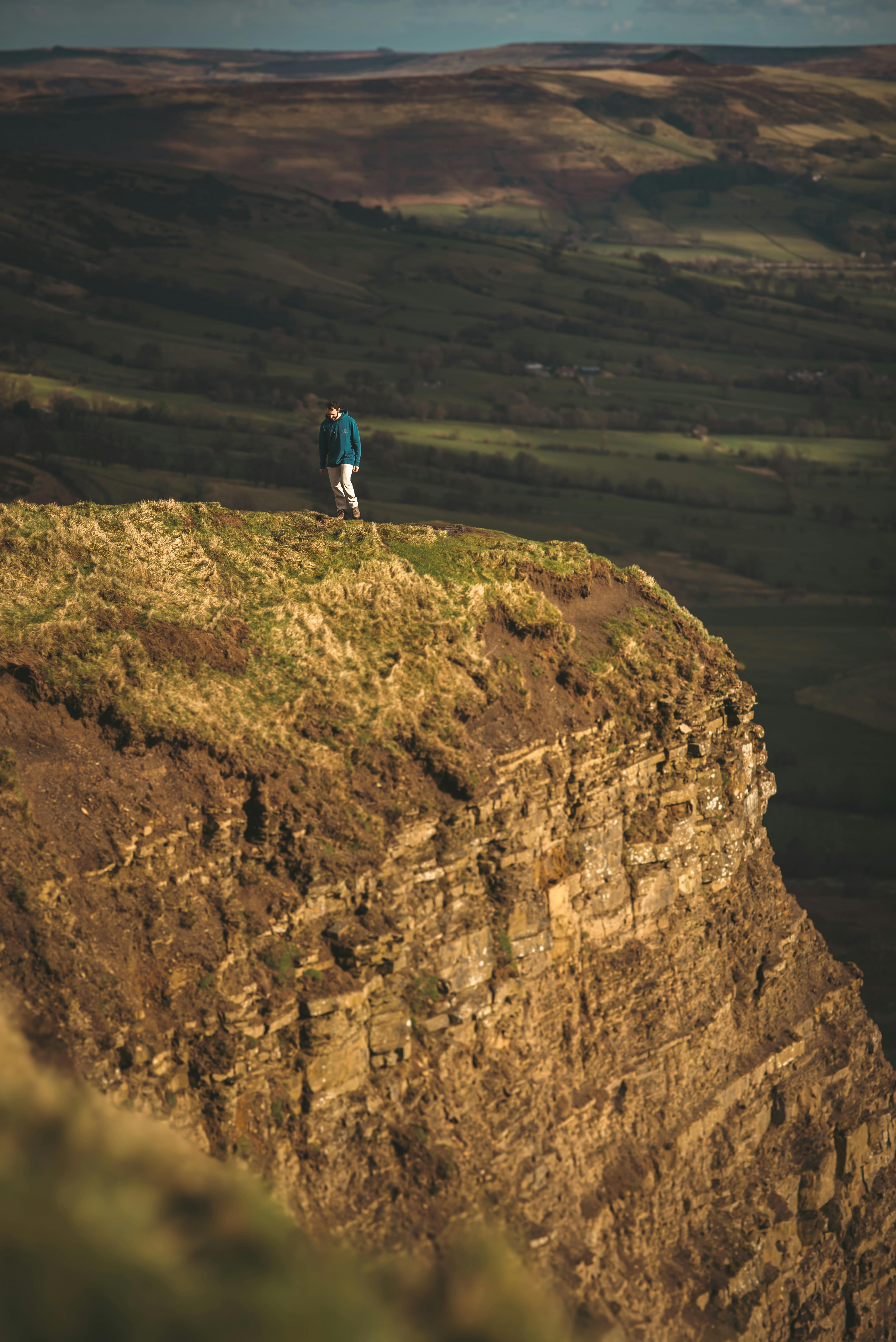 Hiker Standing on Ledge · Free Stock Photo