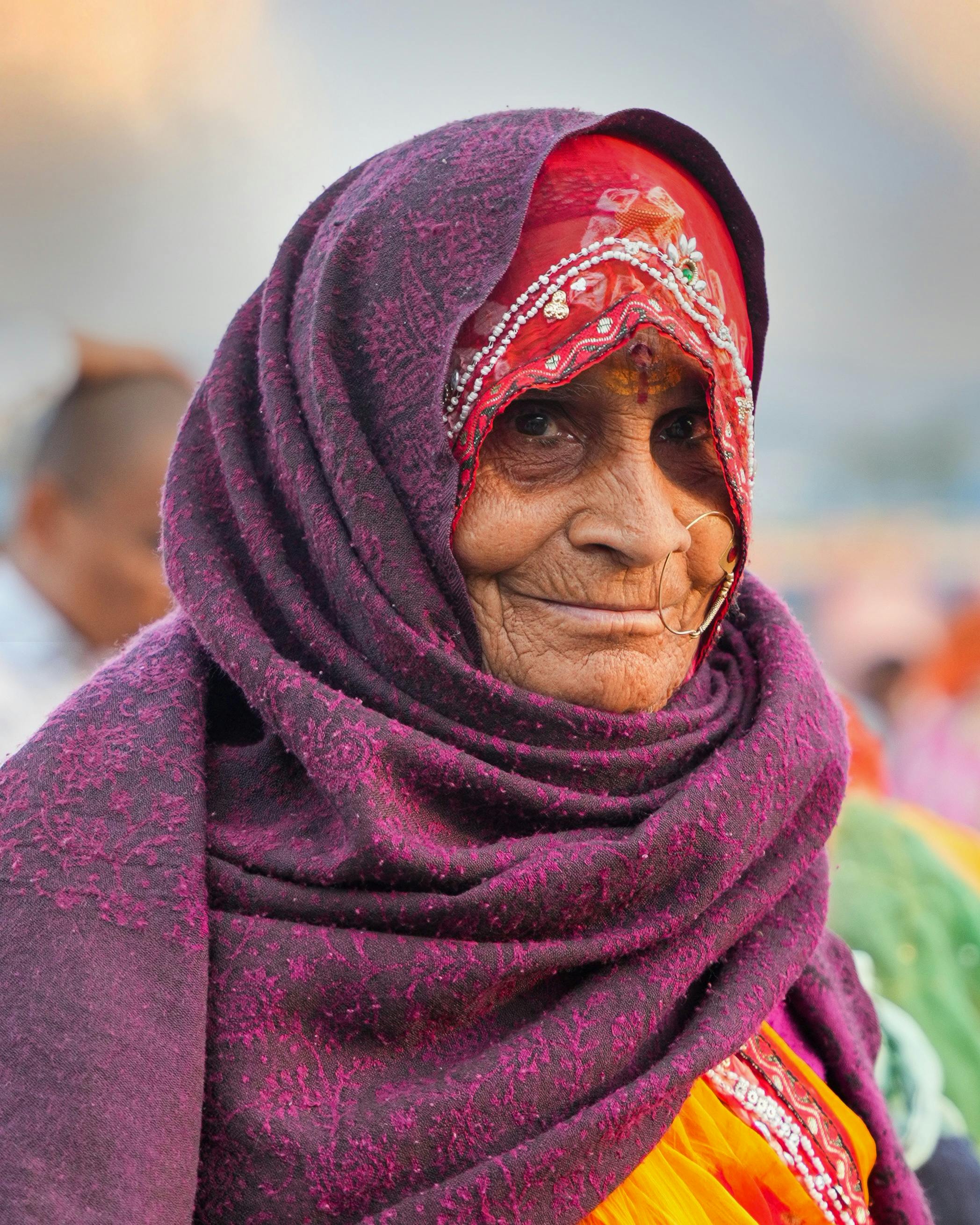 Elderly Woman in Traditional Shawl and Handkerchief · Free Stock Photo