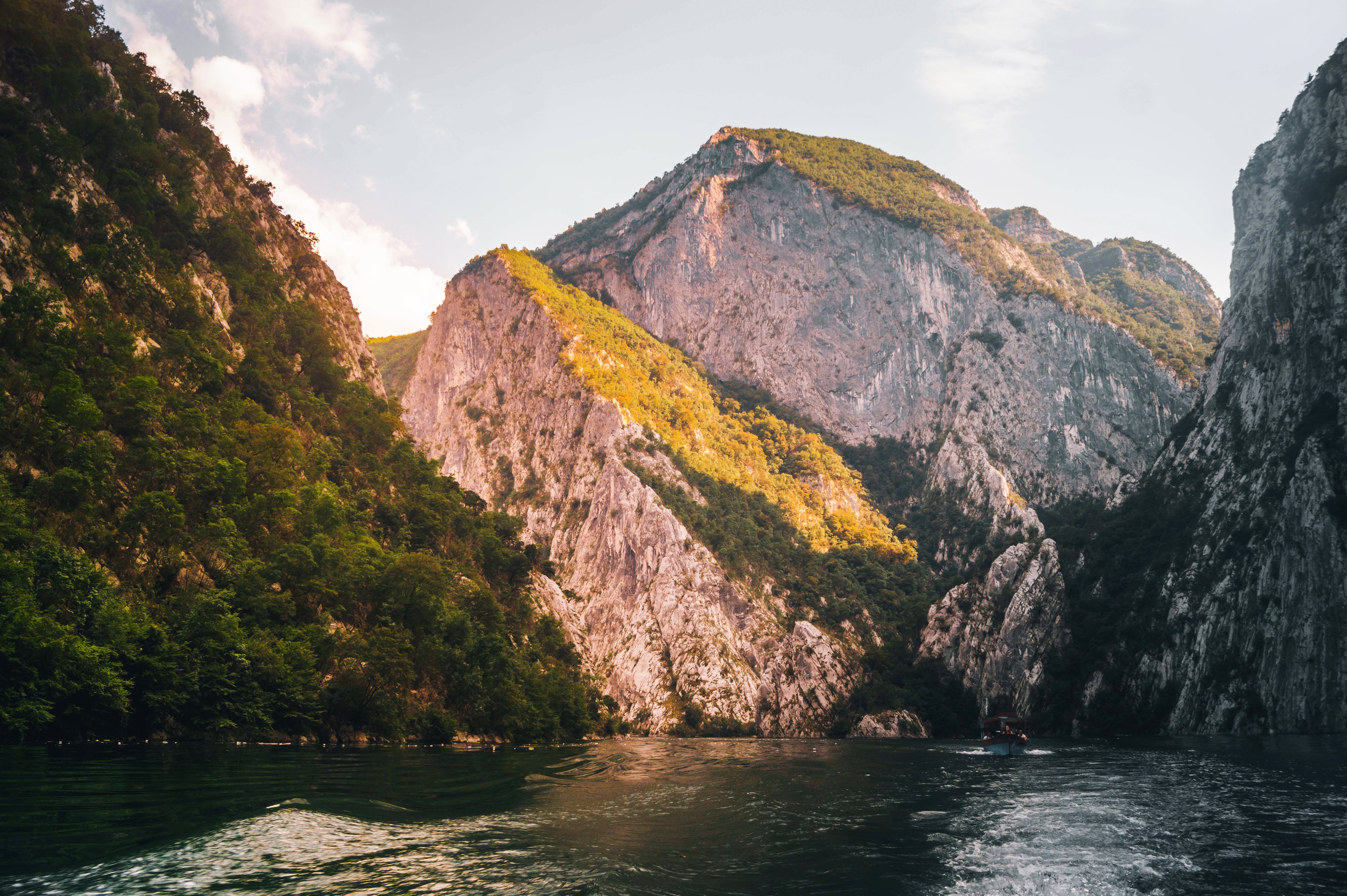 Lake Among Steep Rocky Mountains · Free Stock Photo