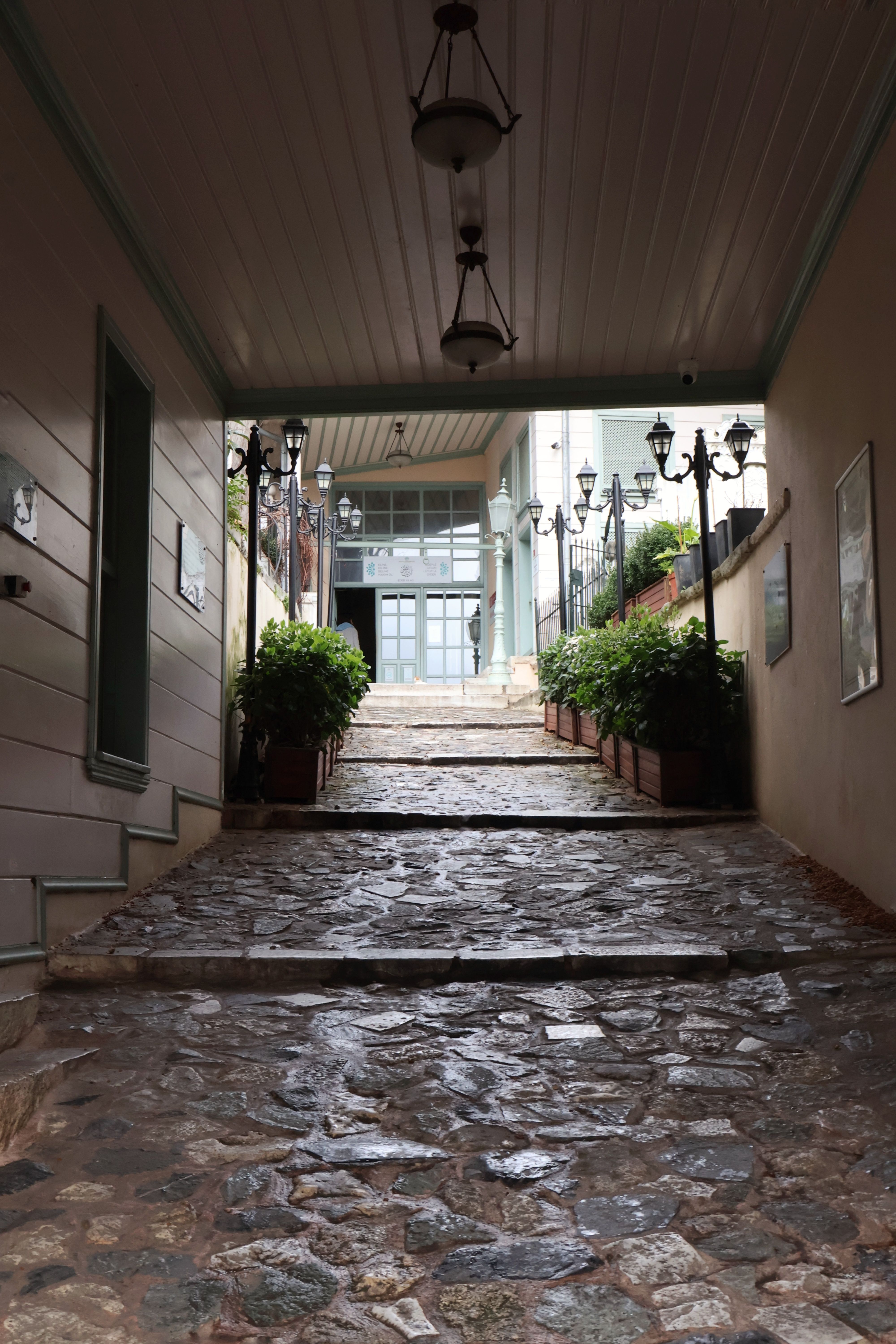 Stepped Walkway Paved with Stones Leading through a Passage to the ...