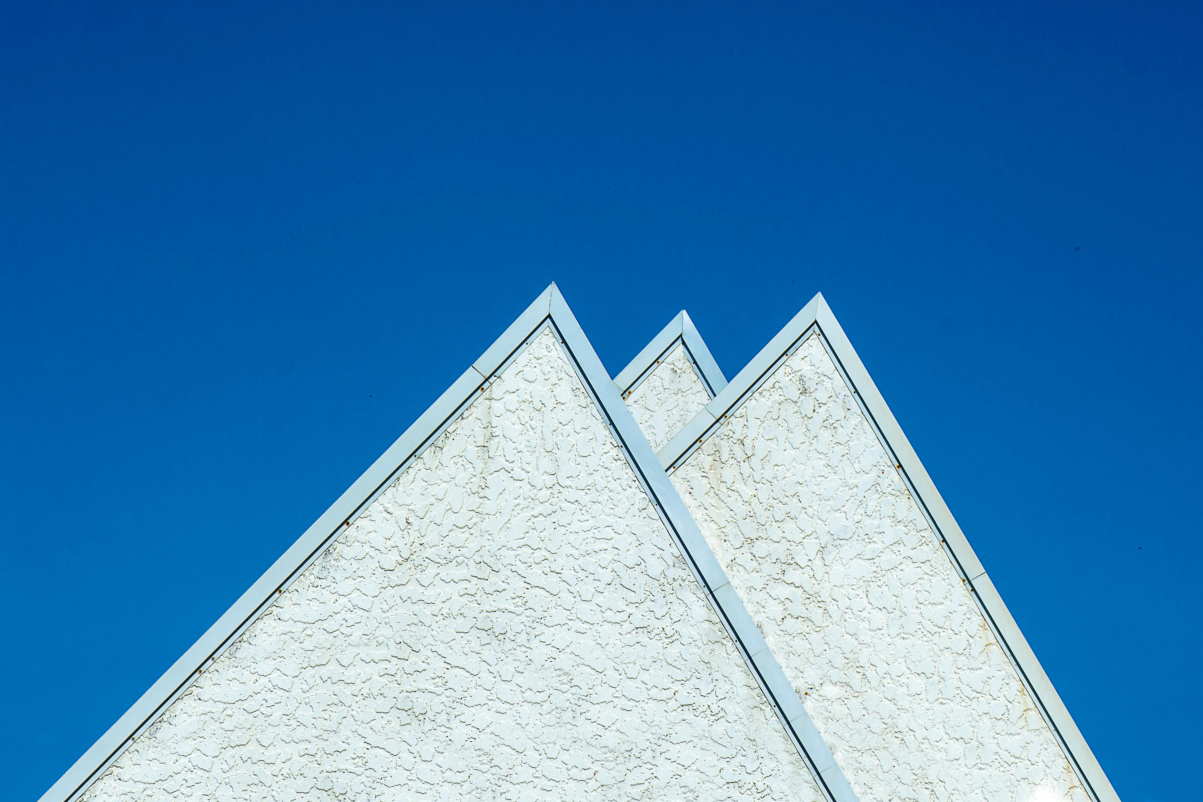 Triangular Rooftops of Building · Free Stock Photo