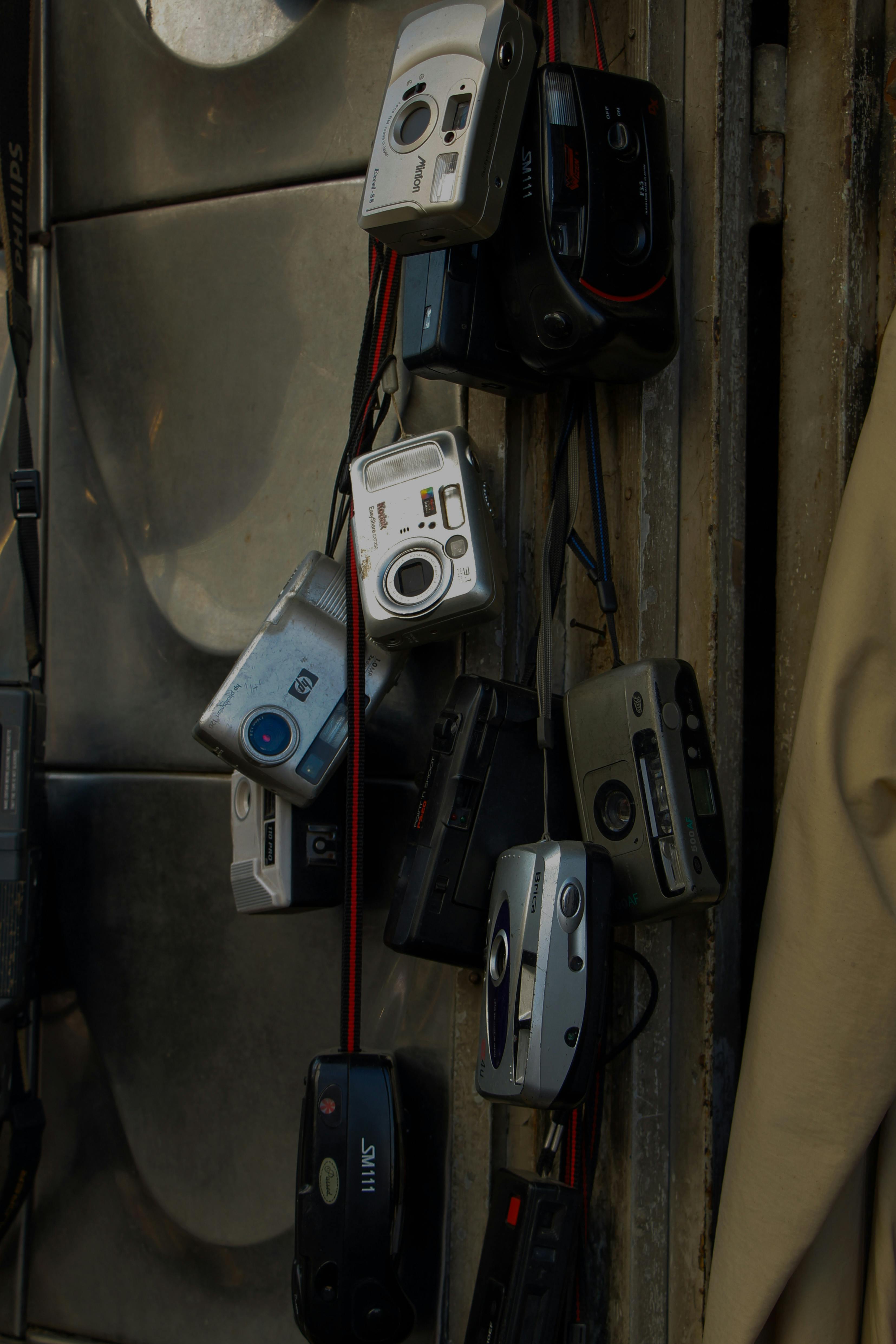 Analogue Cameras Hanging on Wall · Free Stock Photo