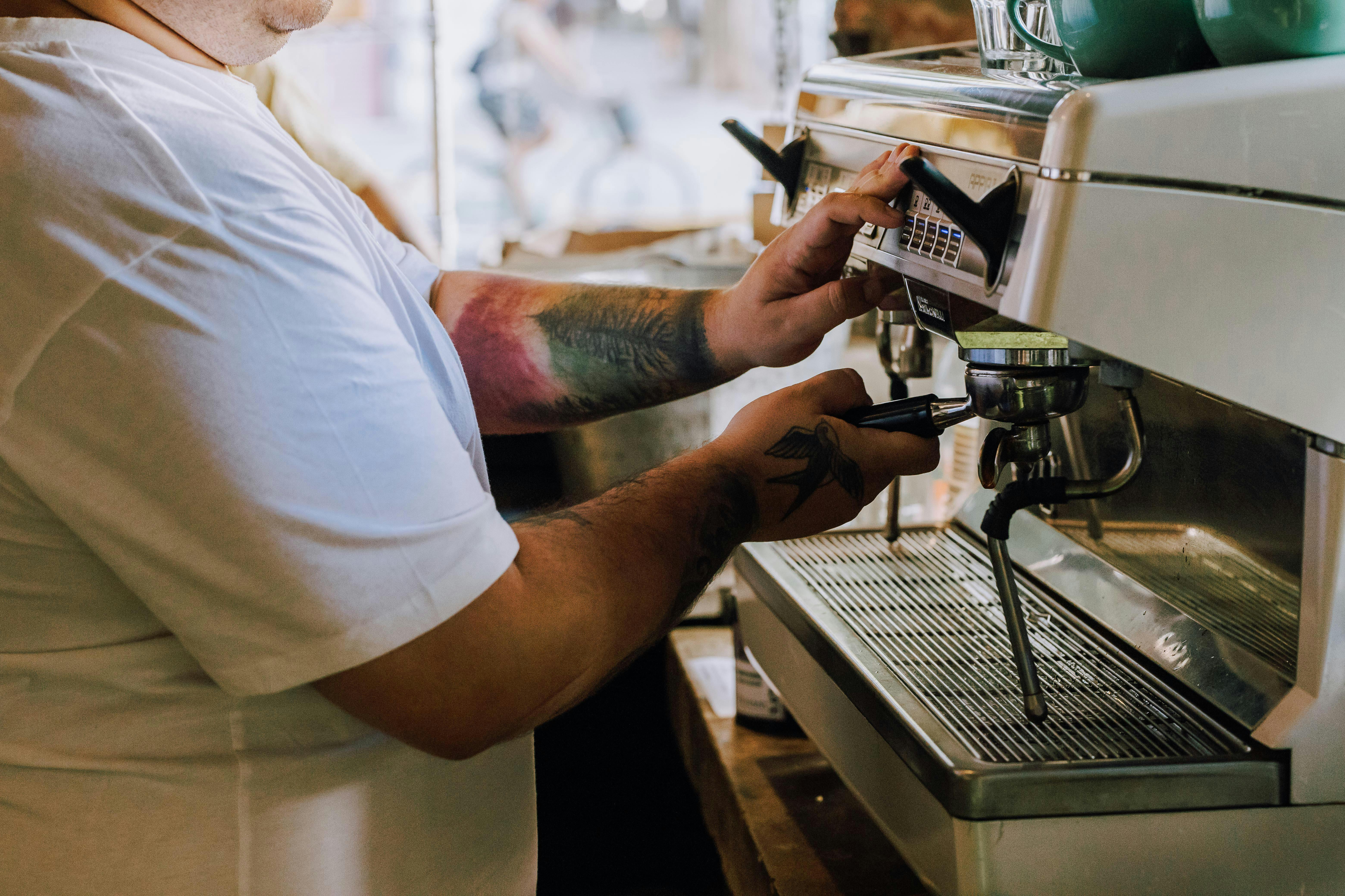 Man Using Coffee Machine · Free Stock Photo