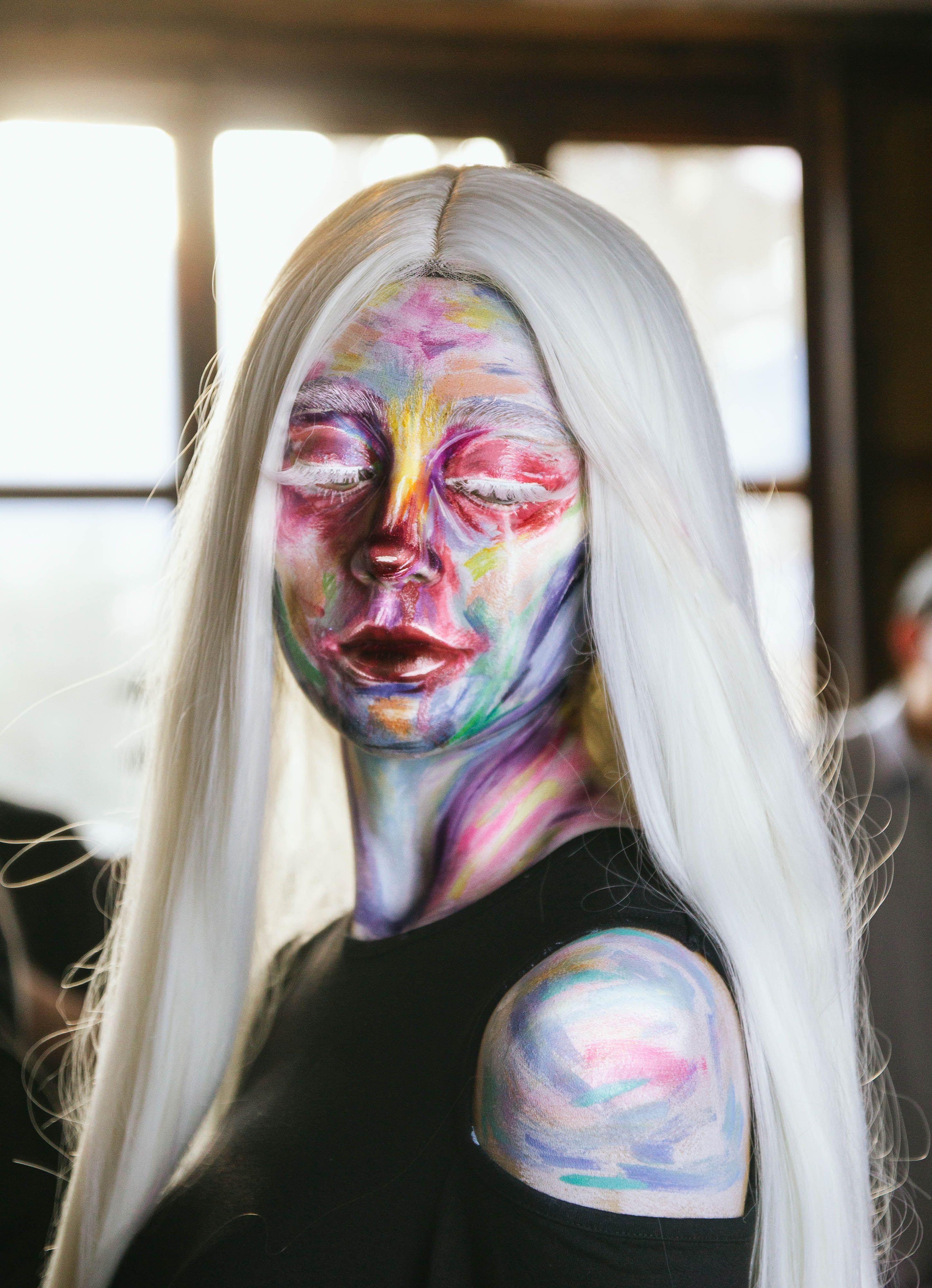 A Woman with her Face Painted · Free Stock Photo