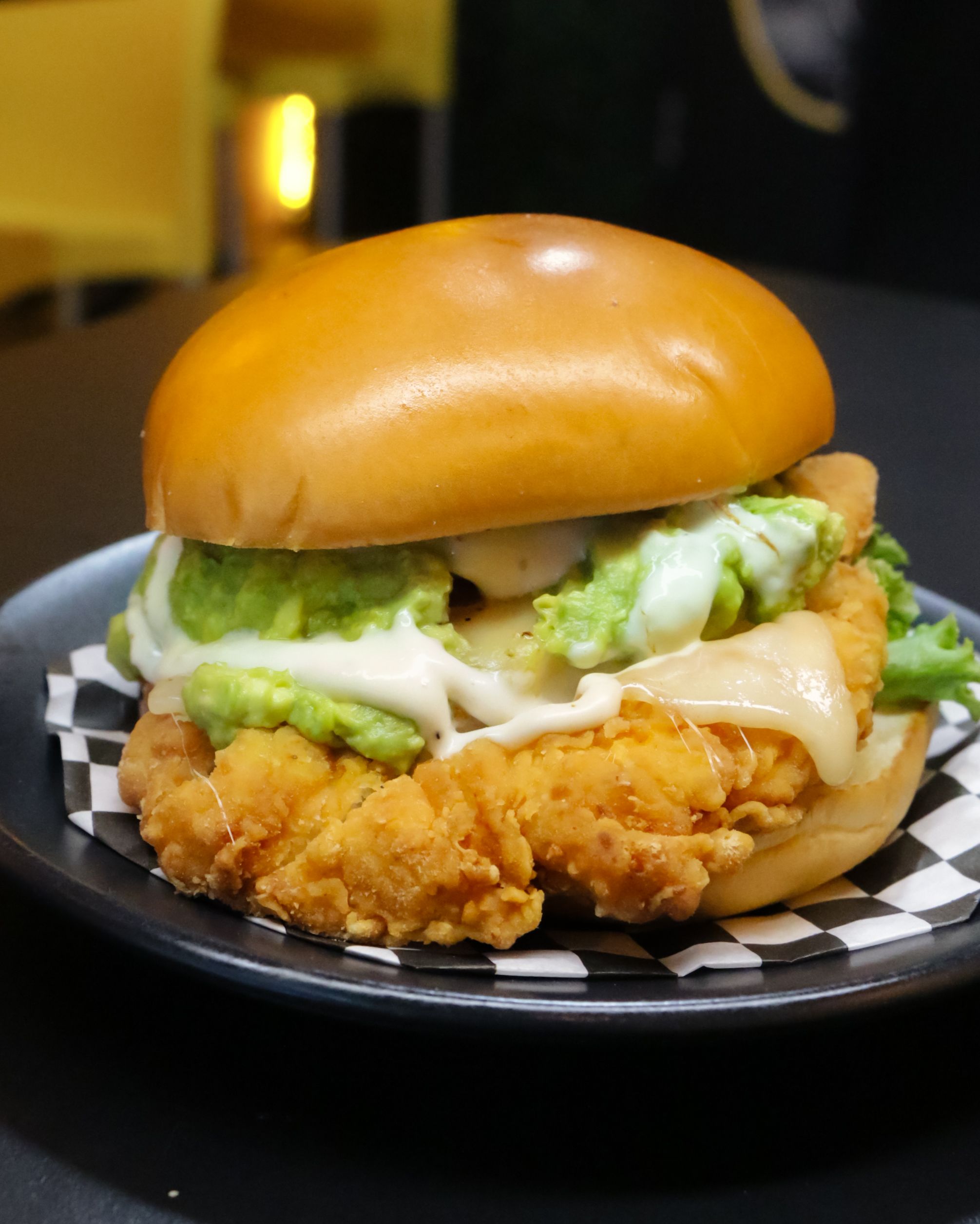 Roasted Boneless Chicken Wings with Cream Sauce and a Burger with Fries ...