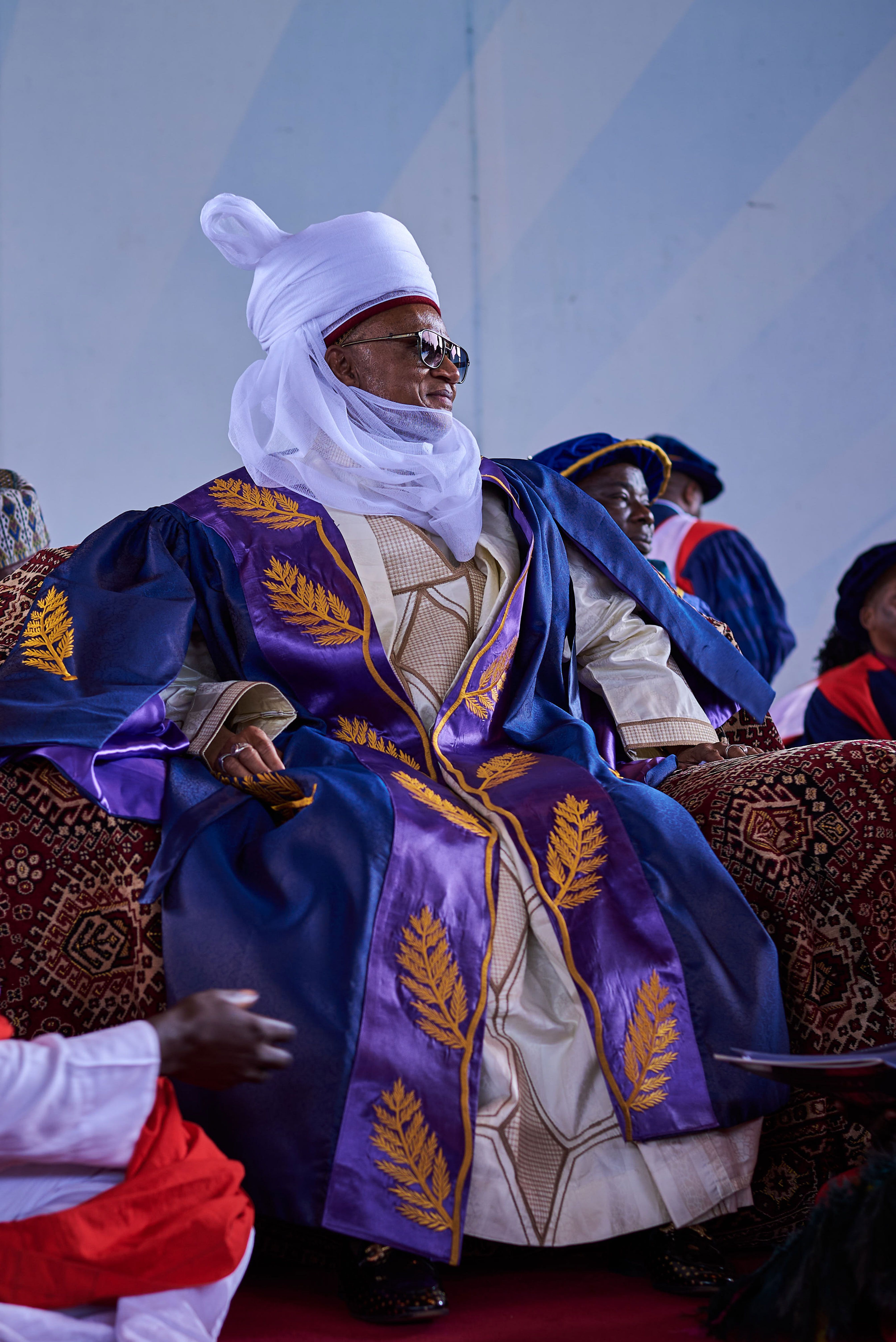 A Man in a Traditional Gown and Turban Sitting at a Ceremony · Free ...