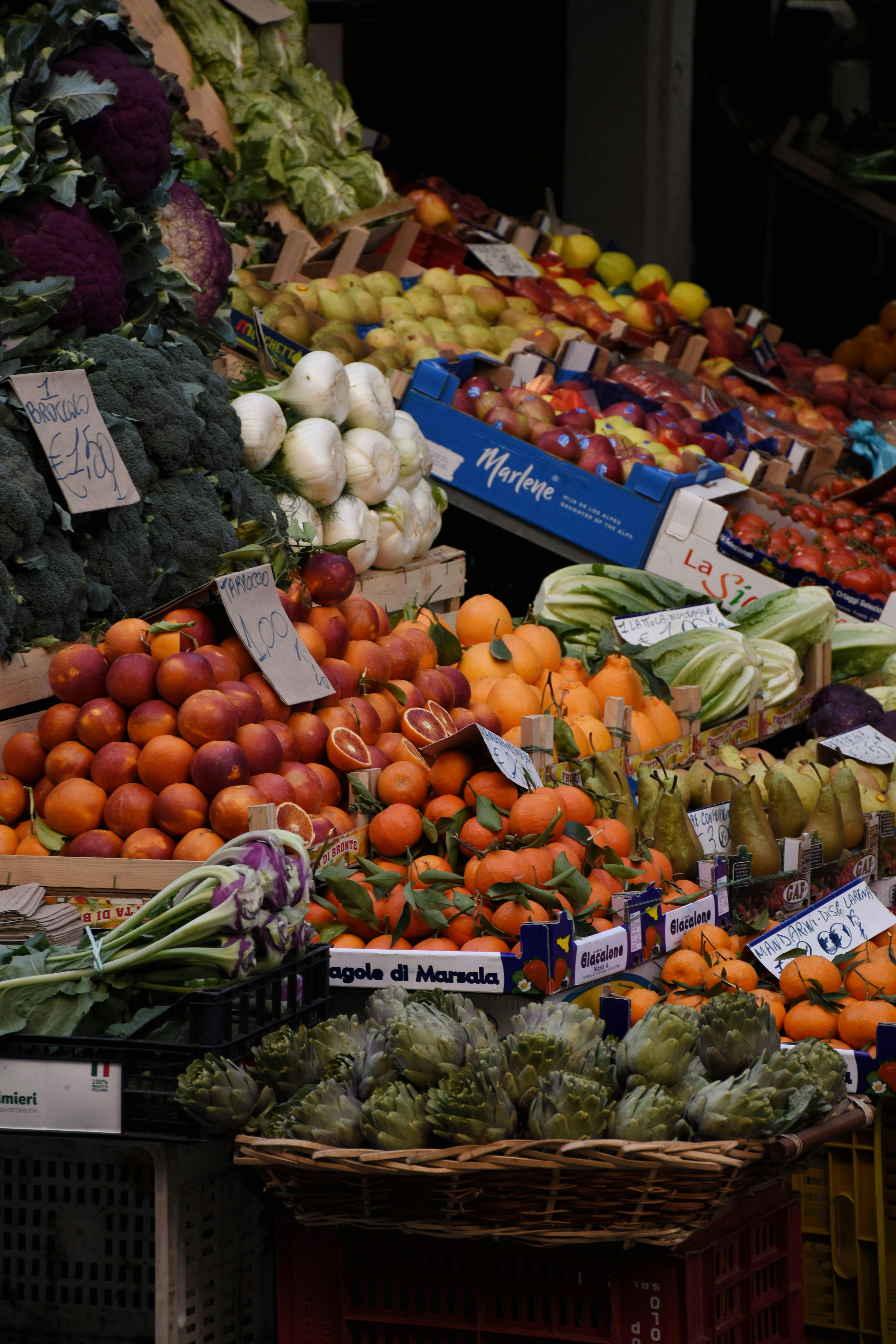 A fruit and vegetable stand with many different types of produce · Free ...