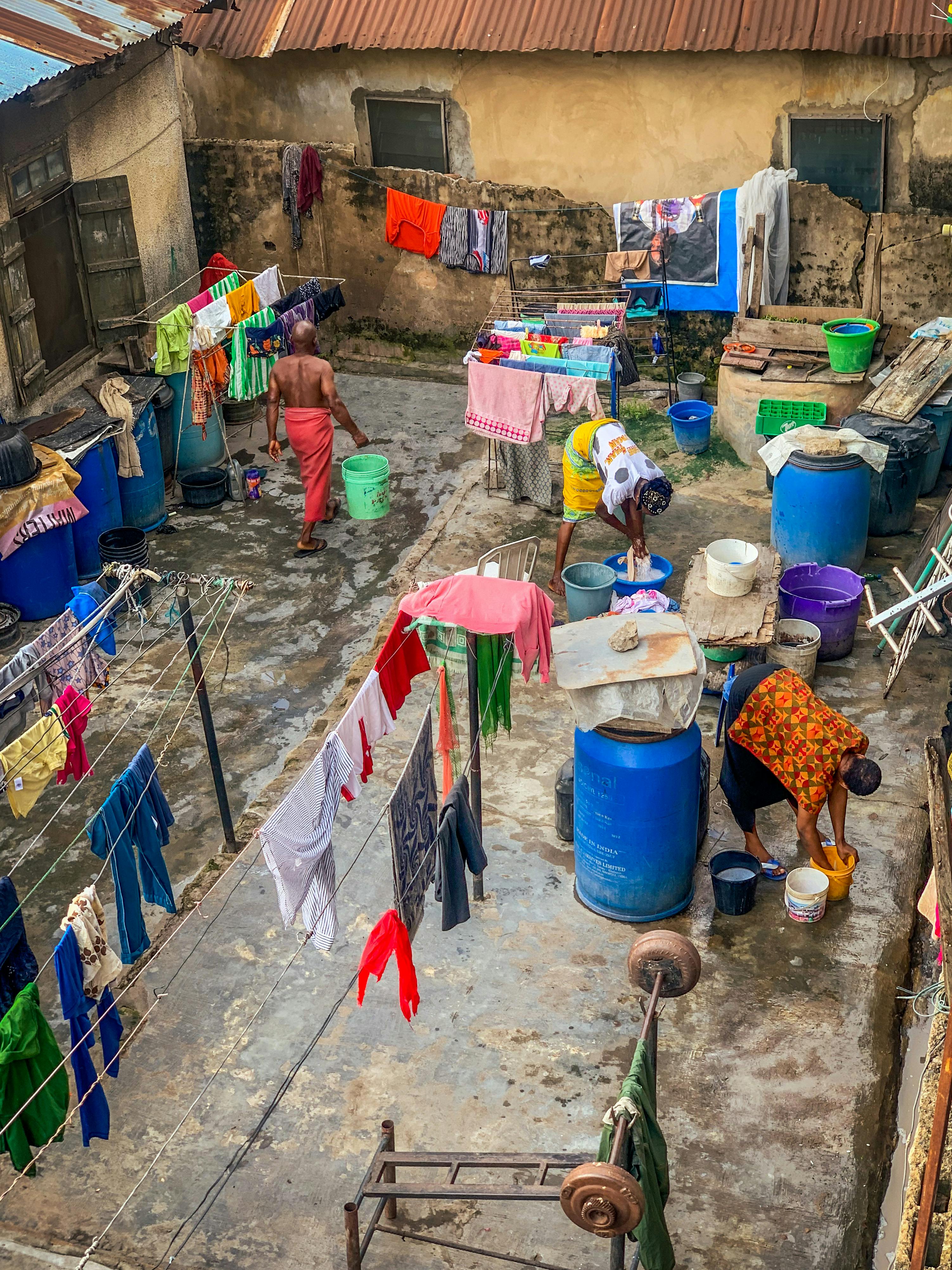 Woman Hand Washing Clothes in Bowls · Free Stock Photo