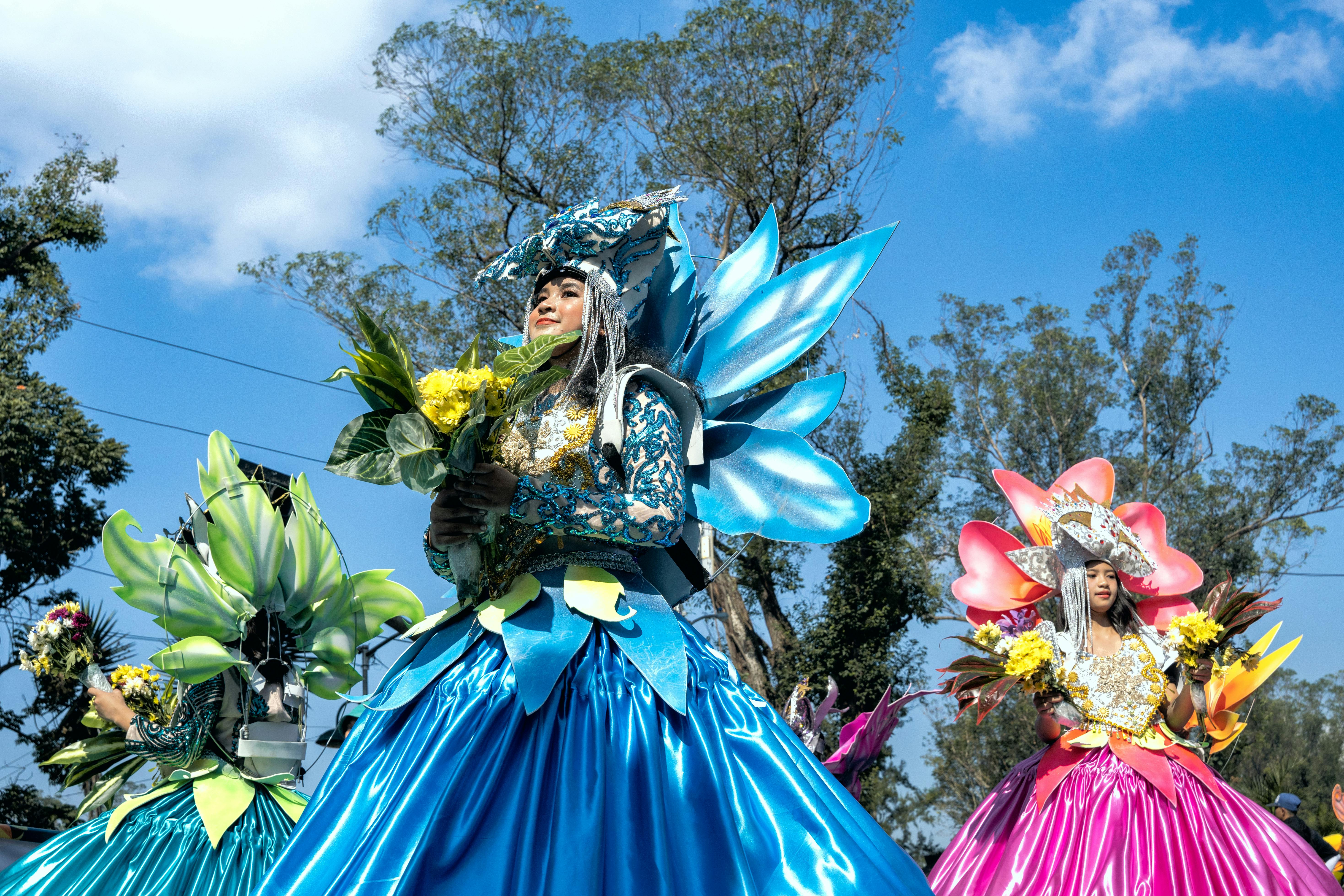Women in Colorful Costumes and Dresses in Parade · Free Stock Photo
