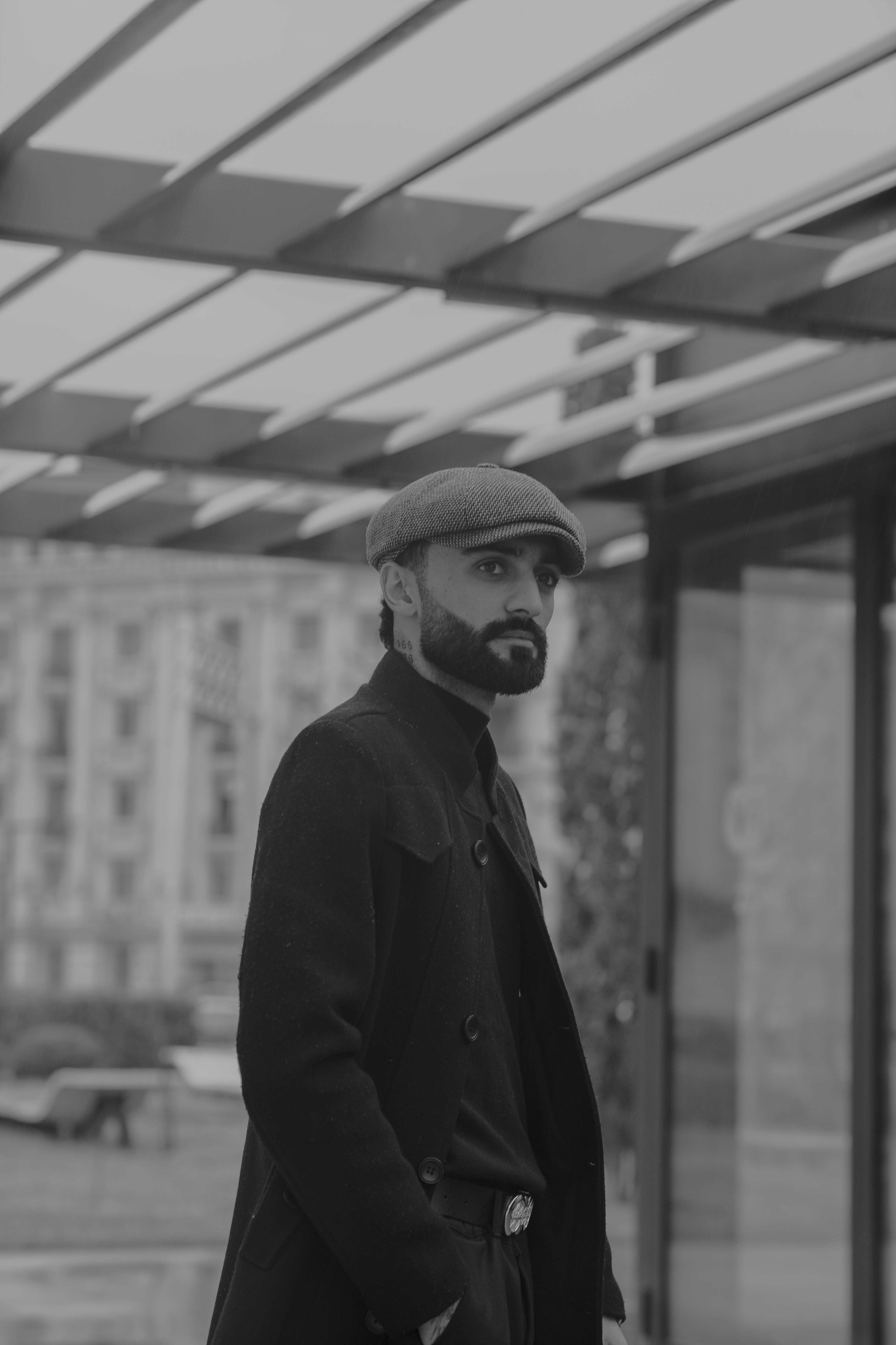 Elegant Man Wearing Flat Cap · Free Stock Photo