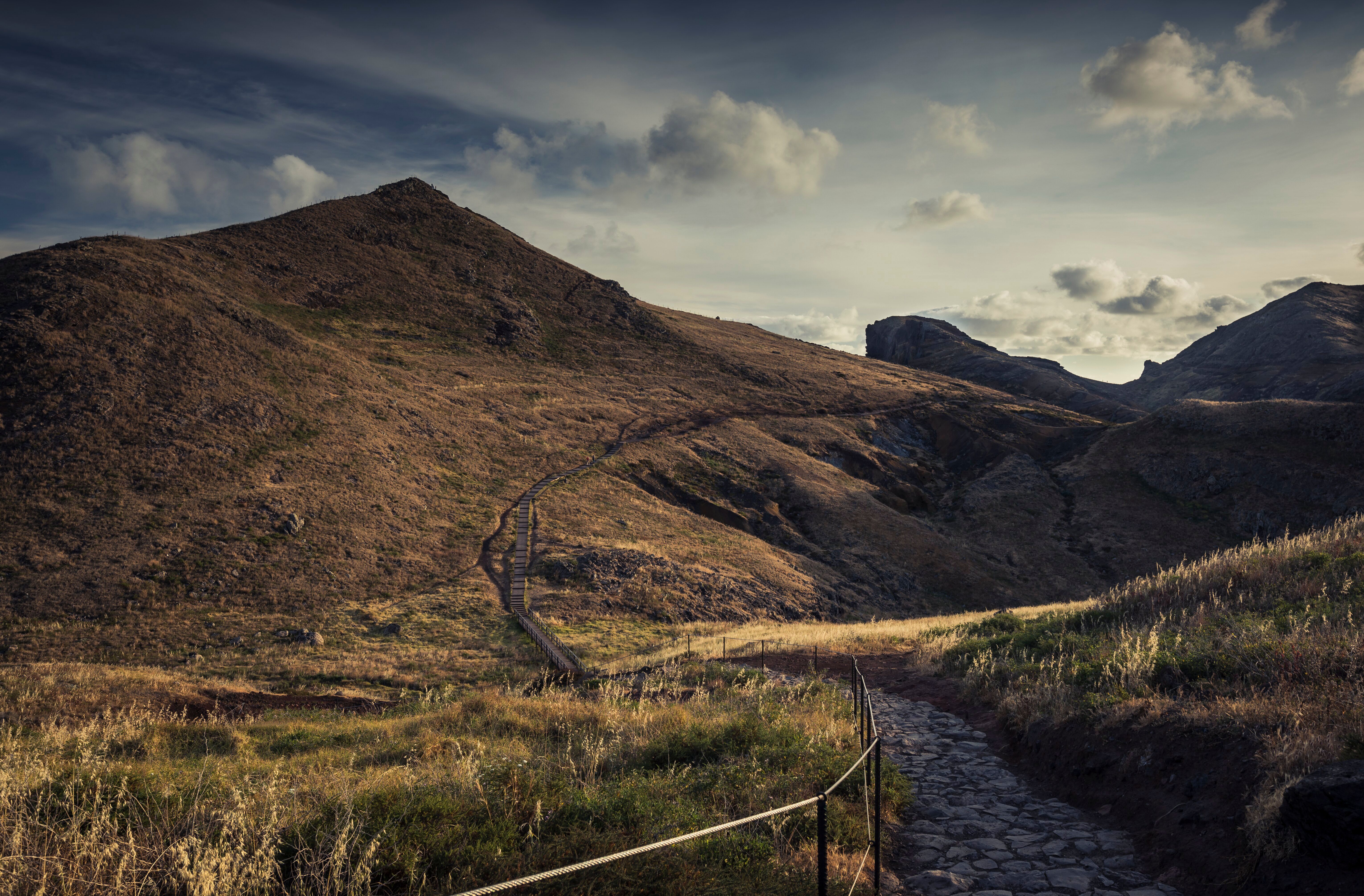 Brown Hill with Cobblestone Path Leading Up · Free Stock Photo
