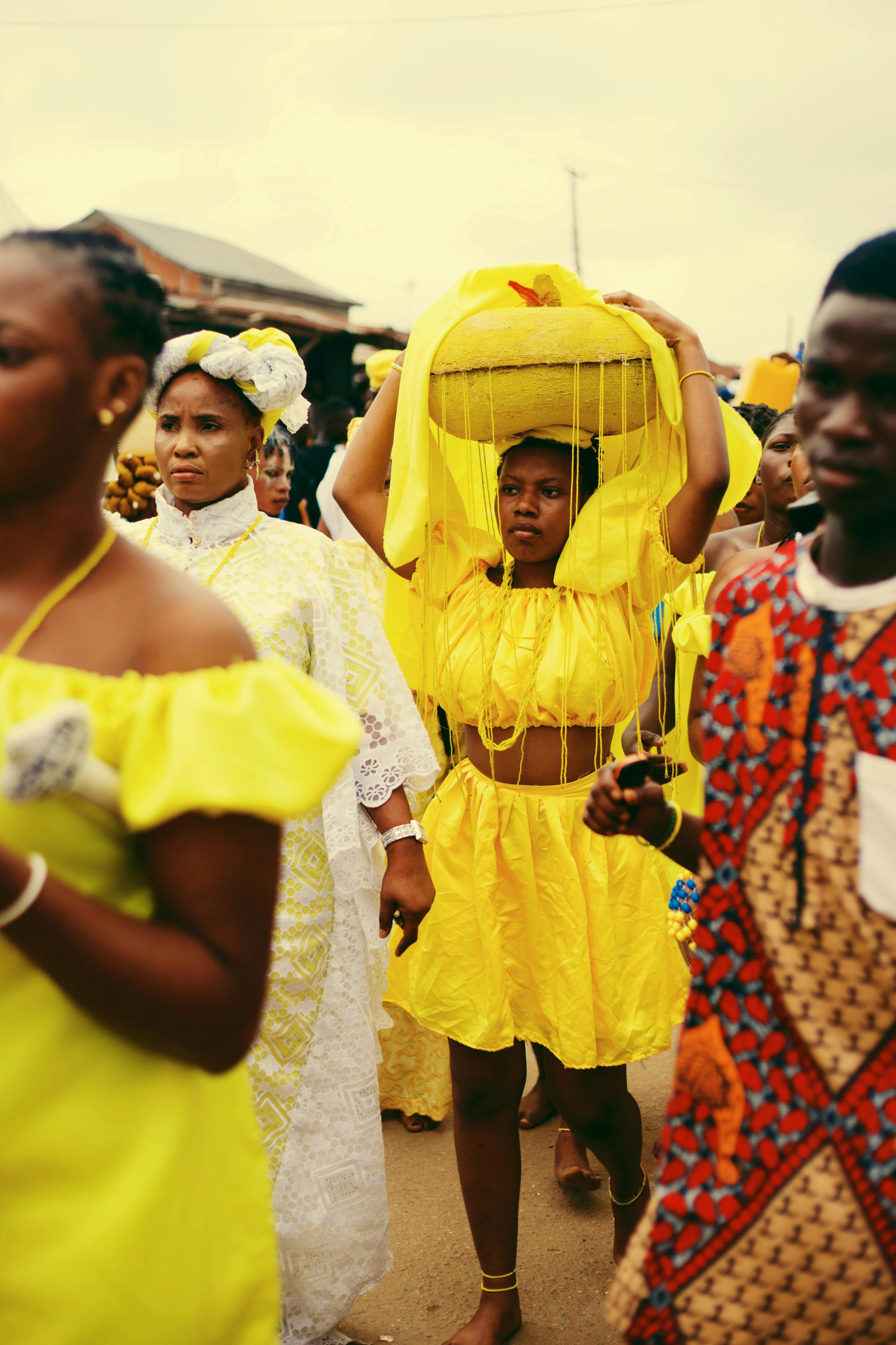 Women in Traditional Clothing Walking in Parade · Free Stock Photo