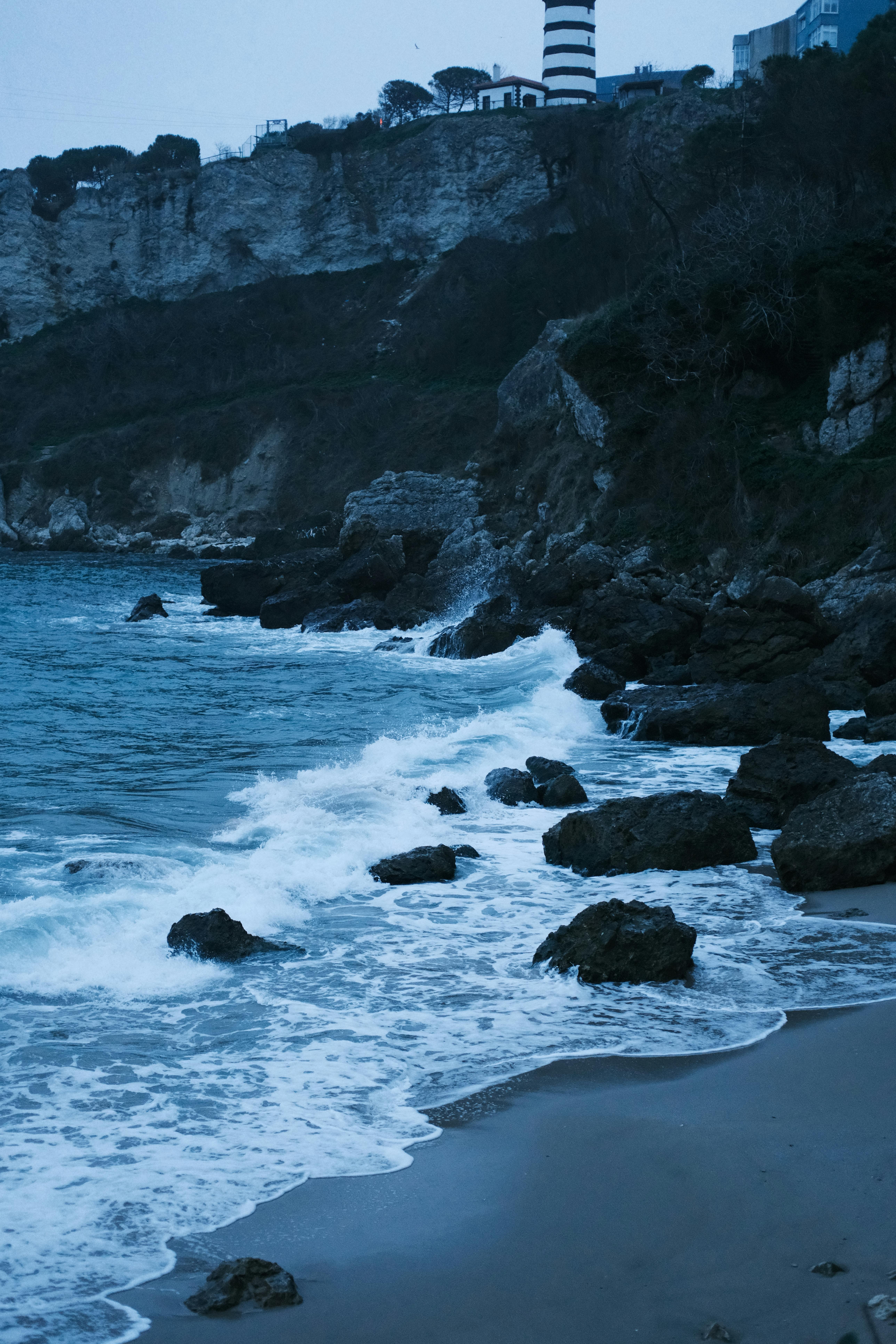 Rocks and Cliff on Sea Coast · Free Stock Photo