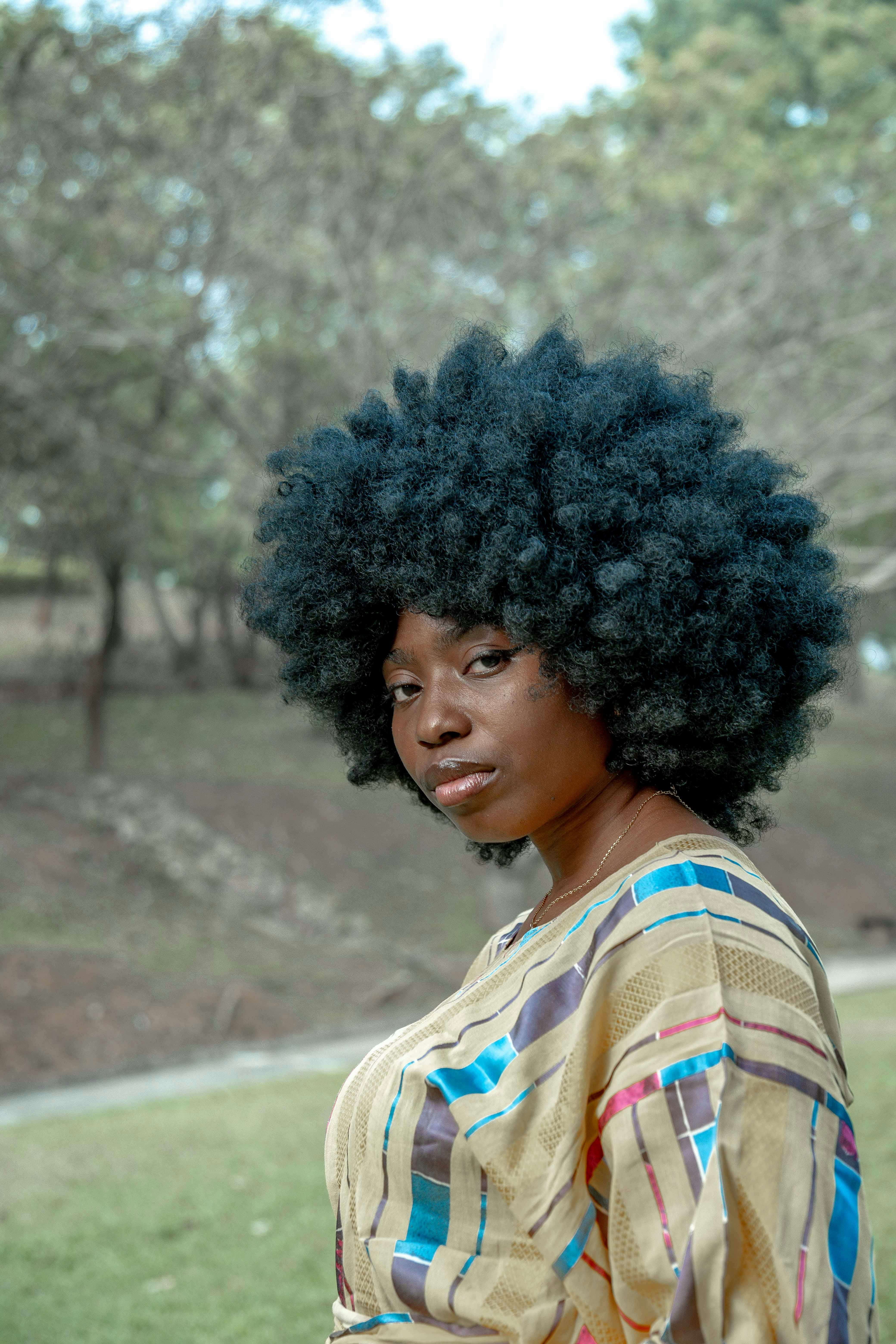 Portrait of Woman with Afro · Free Stock Photo