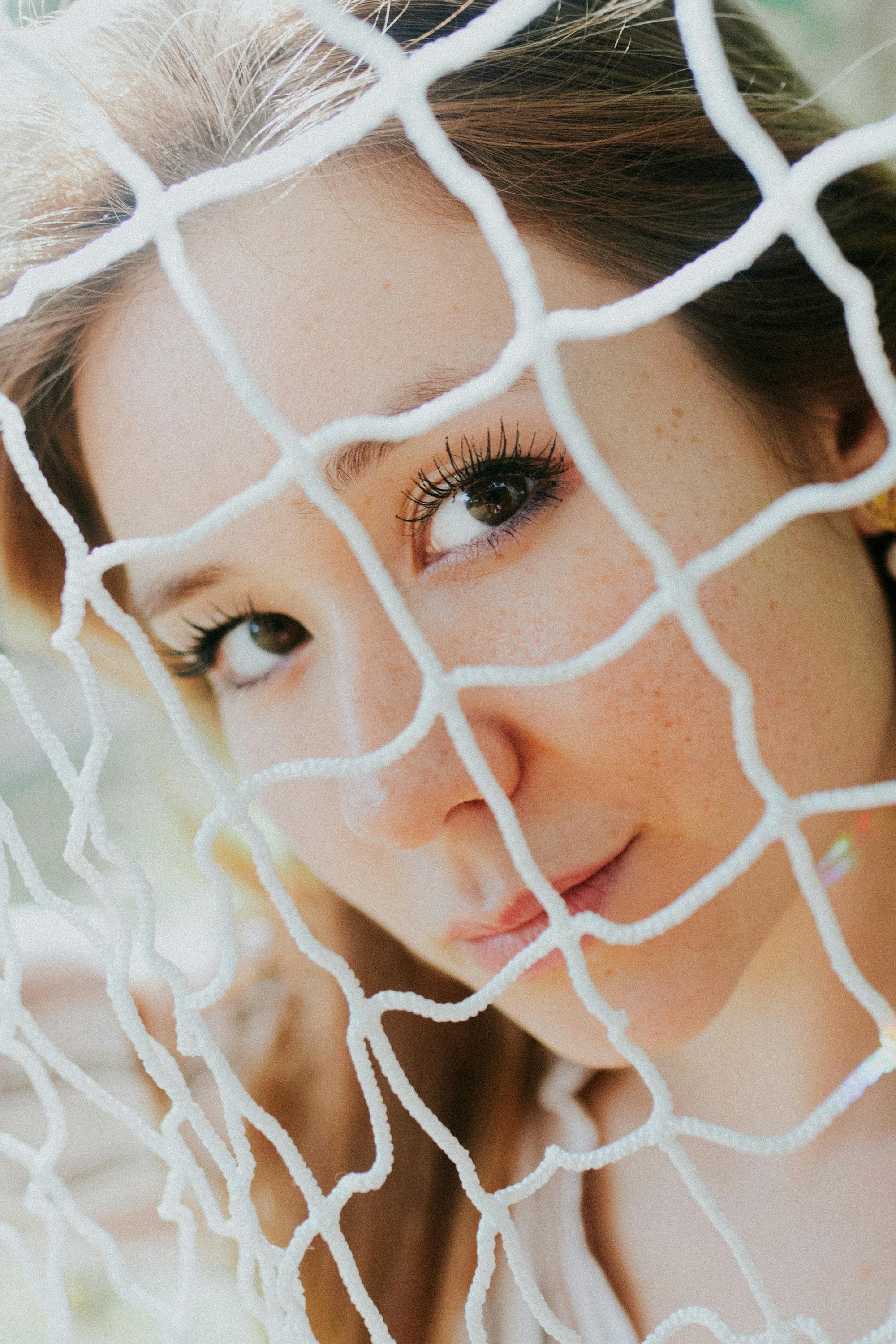 Woman Face behind Net · Free Stock Photo