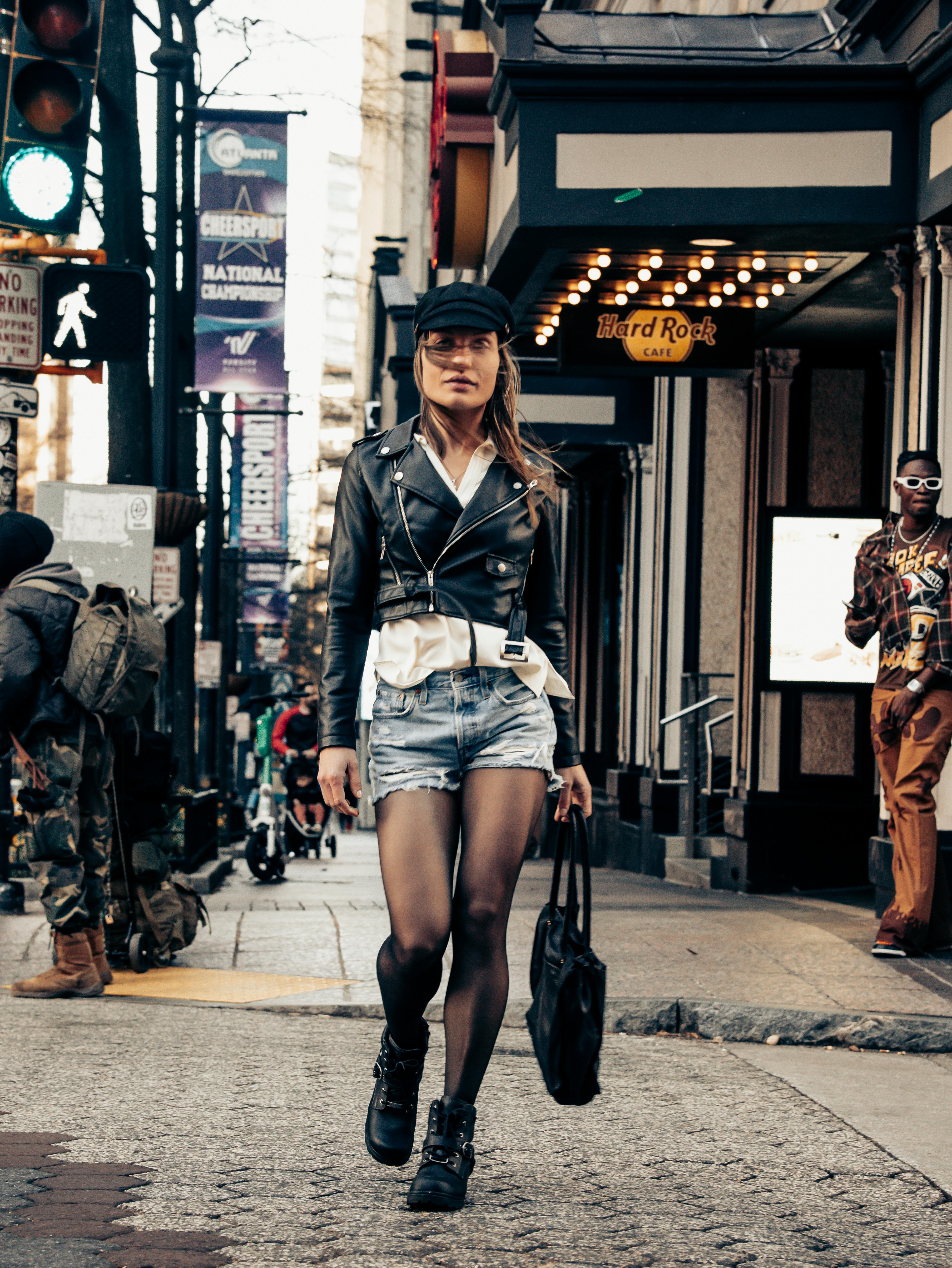 Beautiful fashion model walking in the street · Free Stock Photo