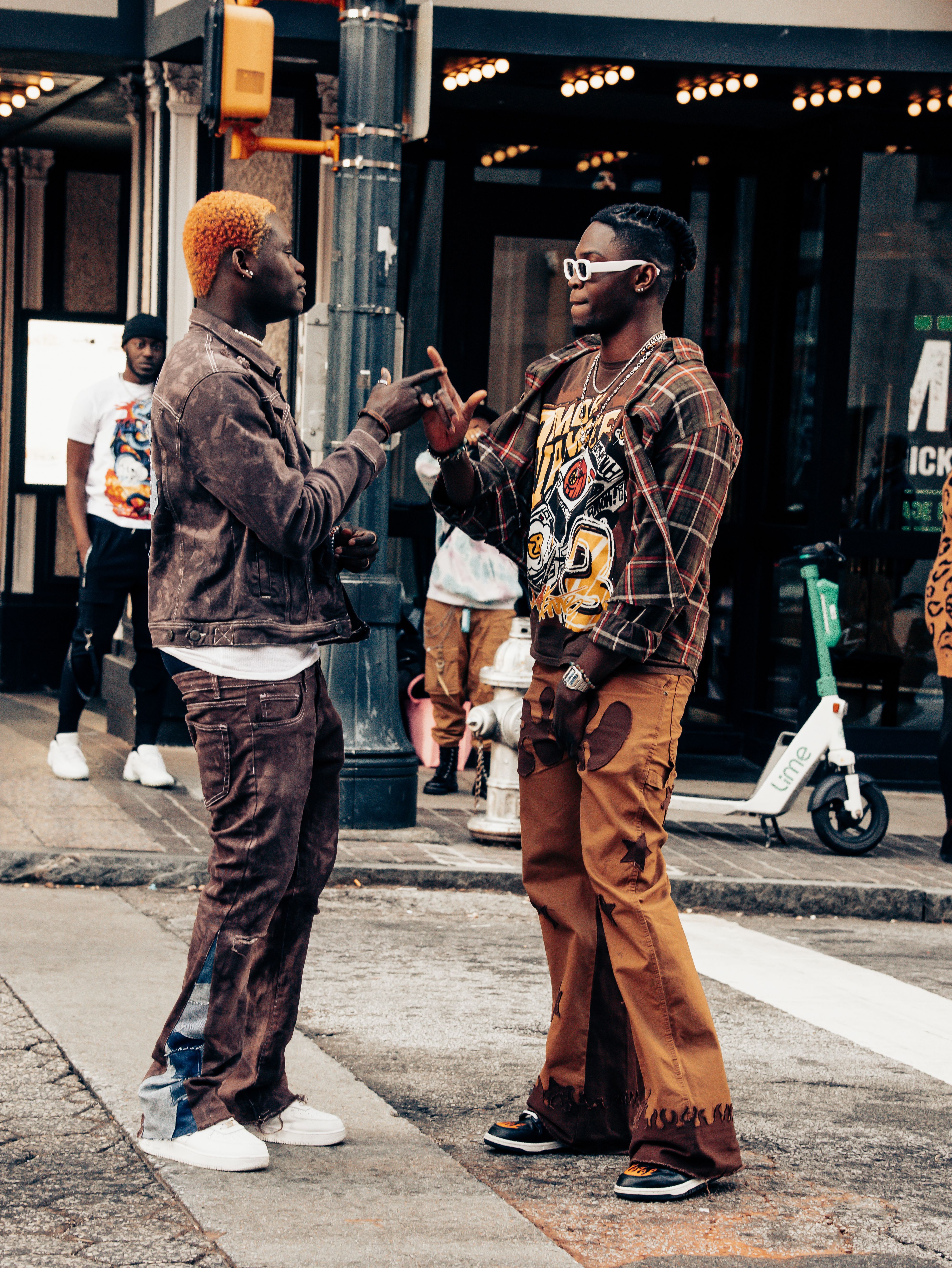 2 African fashion models posing in the street · Free Stock Photo