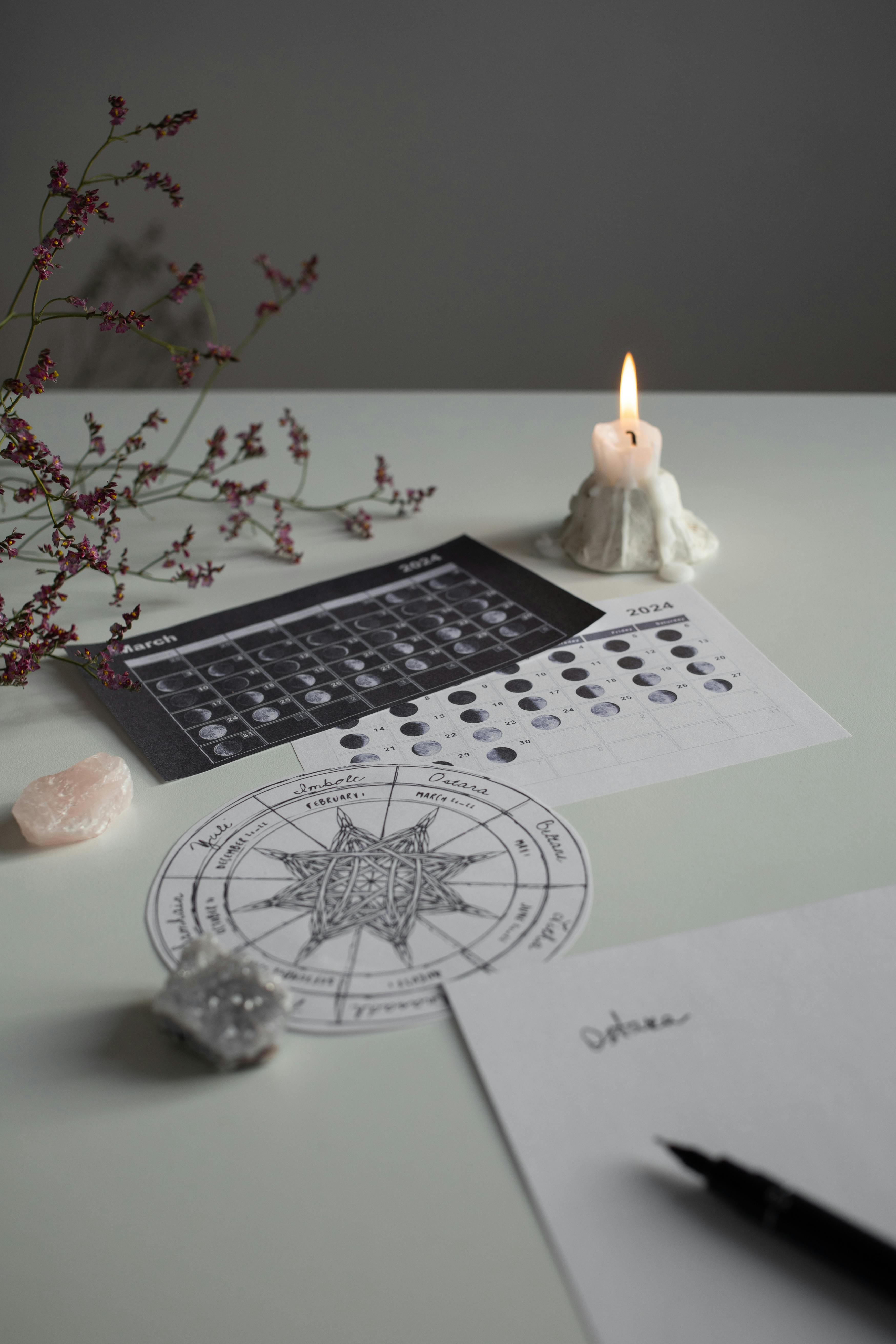 Moon Phases on Cards by Wheel of Year on White Desk · Free Stock Photo