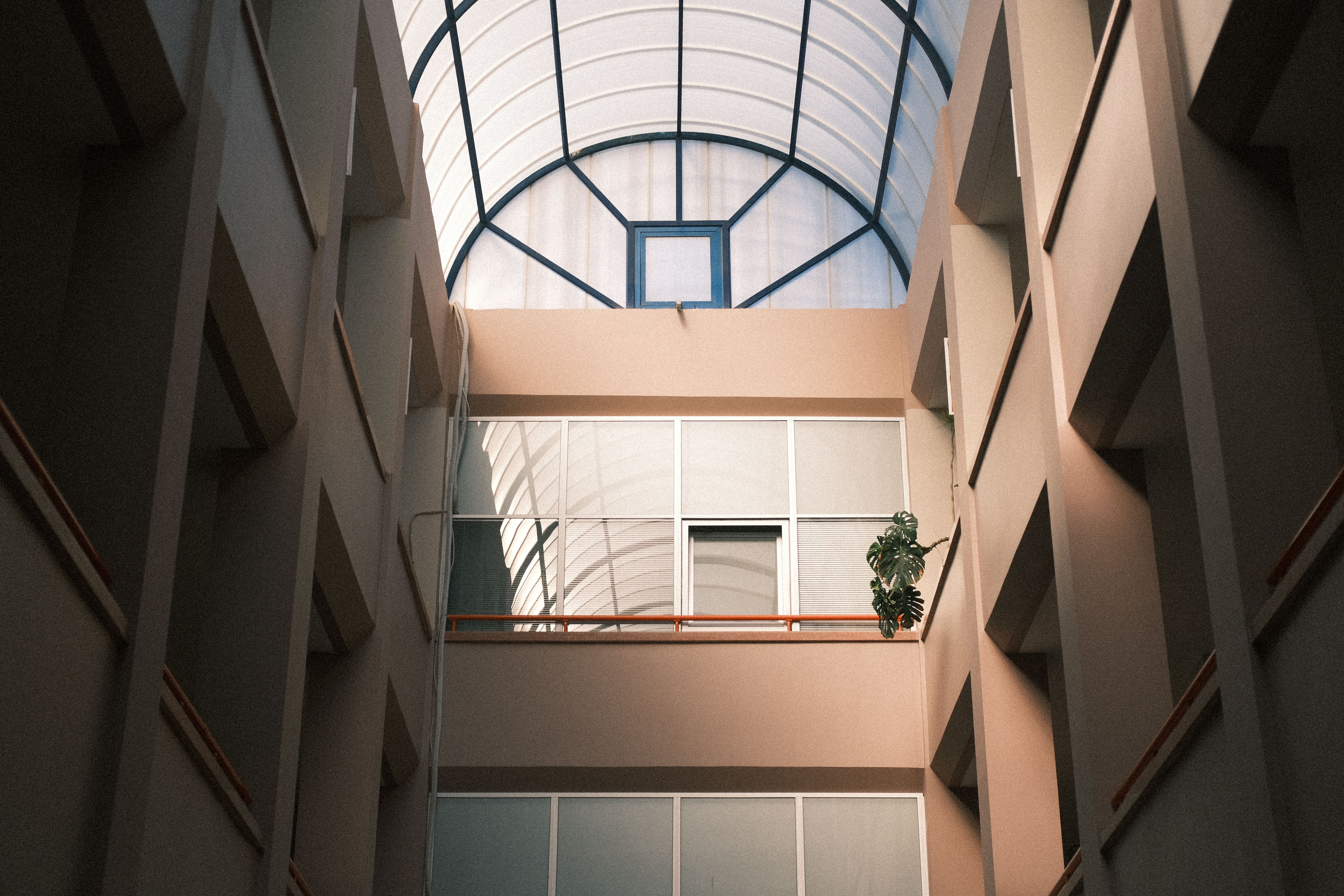 Windows at Wall Under Glass Ceiling in Hotel · Free Stock Photo