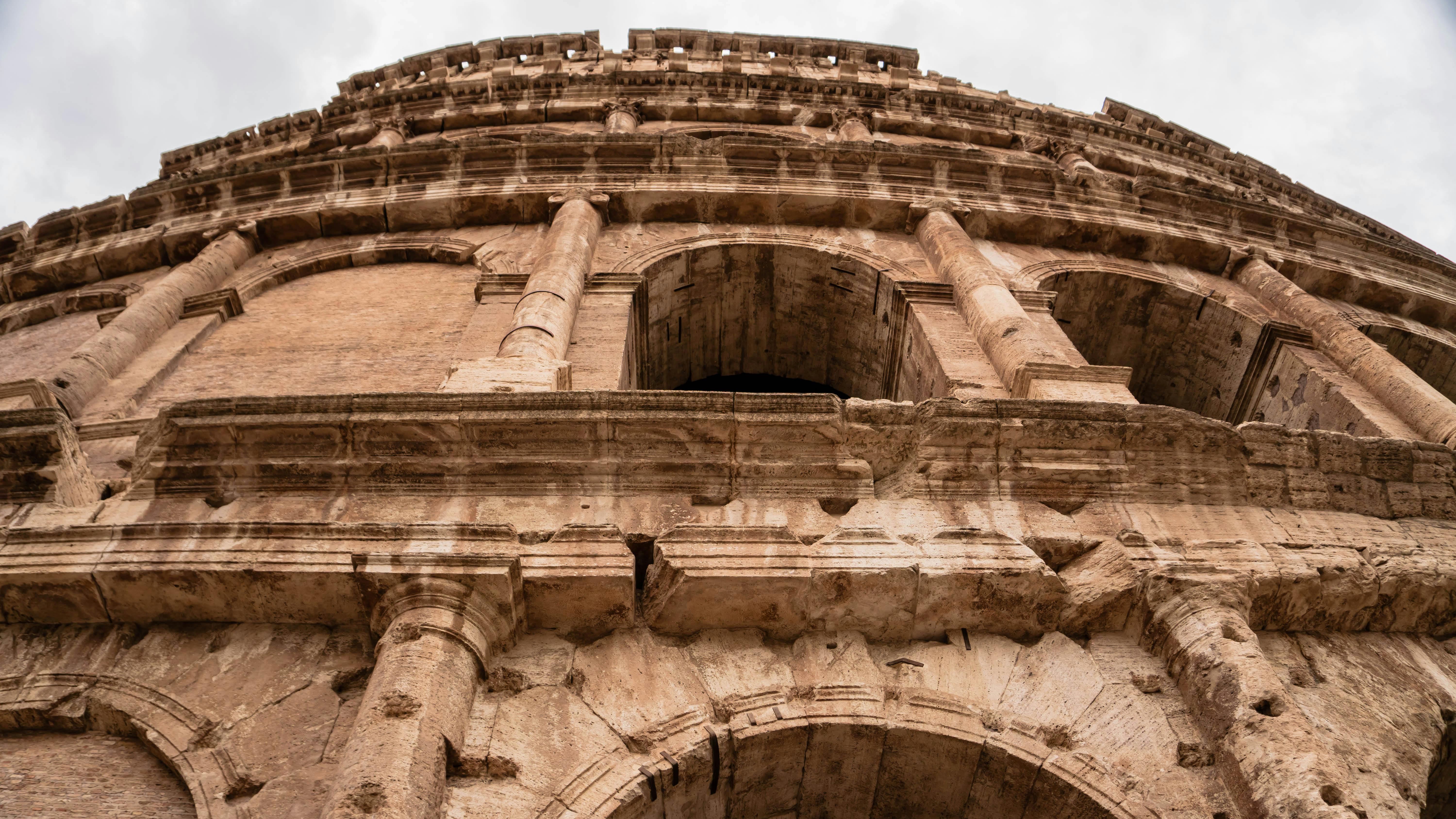 Low Angle Shot of Colosseum Wall · Free Stock Photo