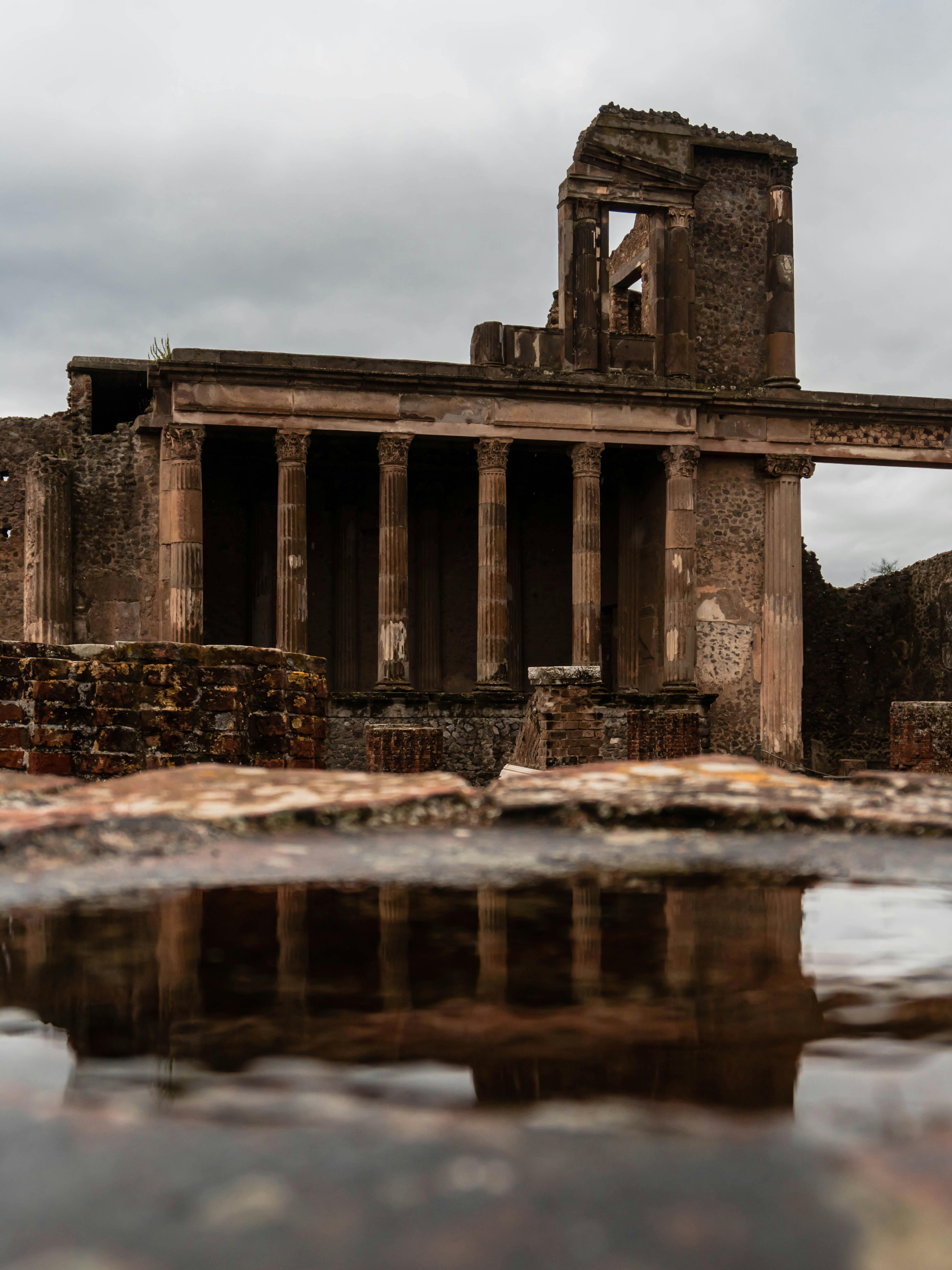 Puddle near Ancient Ruins in Rome · Free Stock Photo