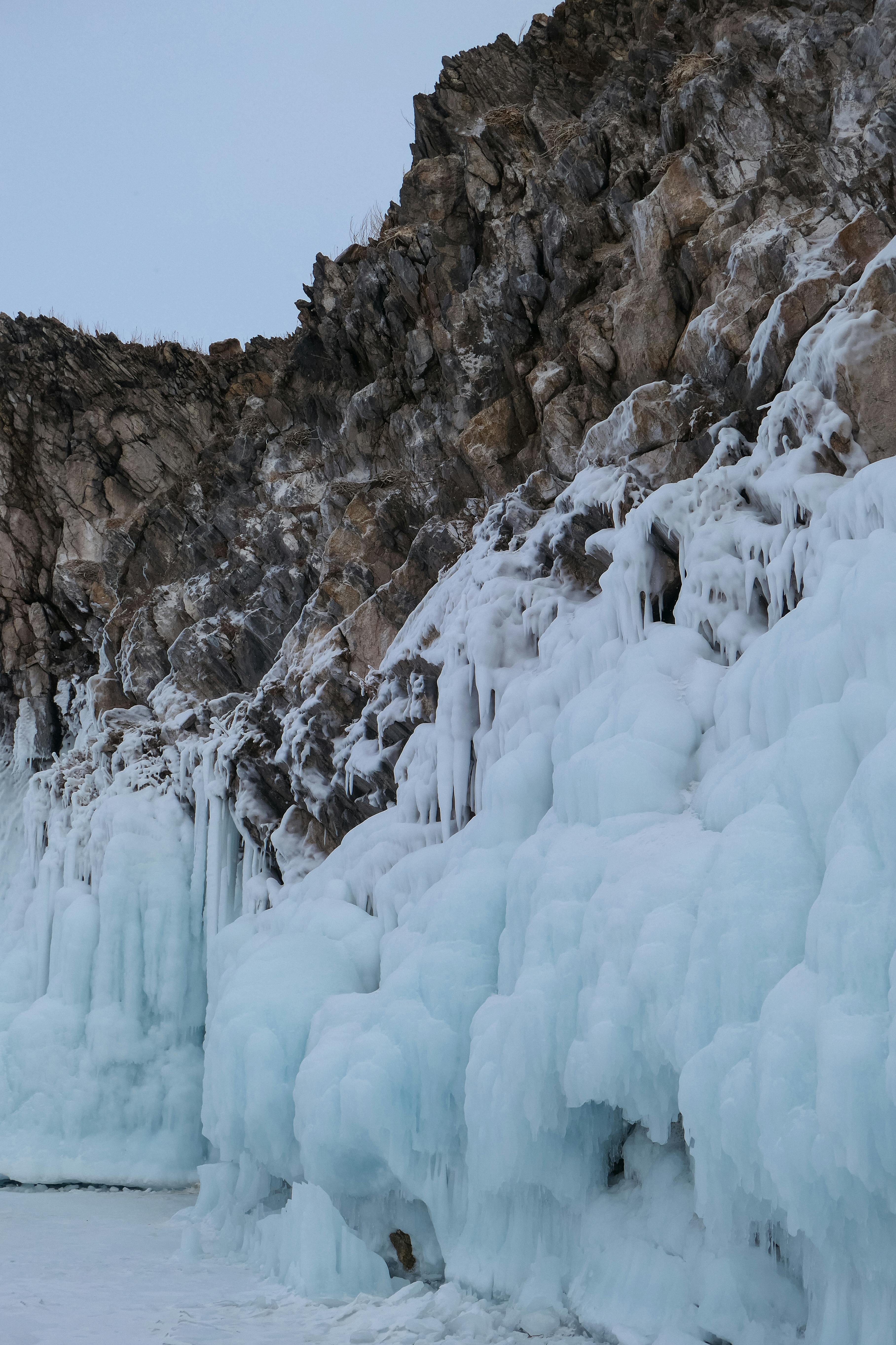 Rock Wall Covered in Ice · Free Stock Photo