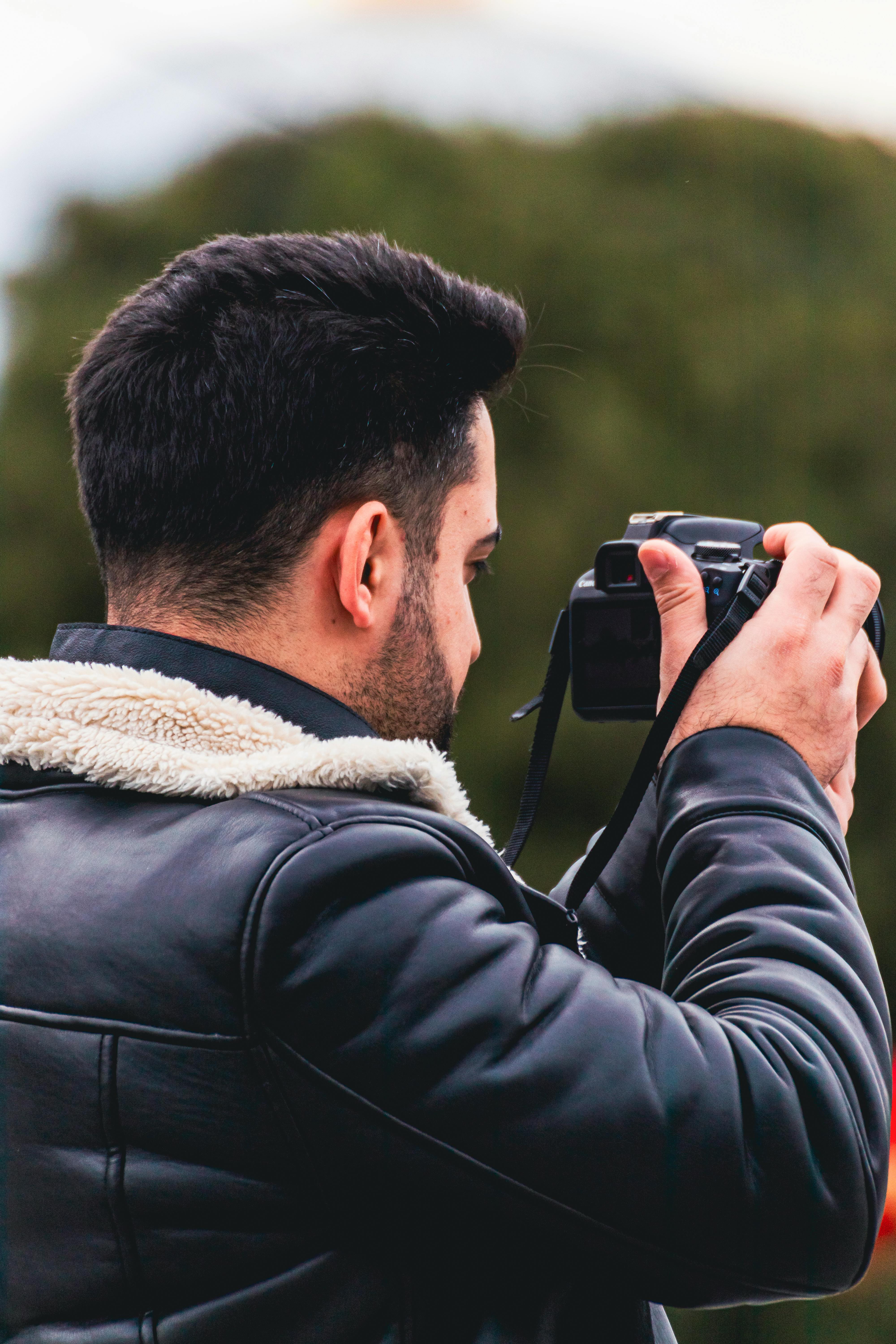 Photo of Man Taking Picture · Free Stock Photo