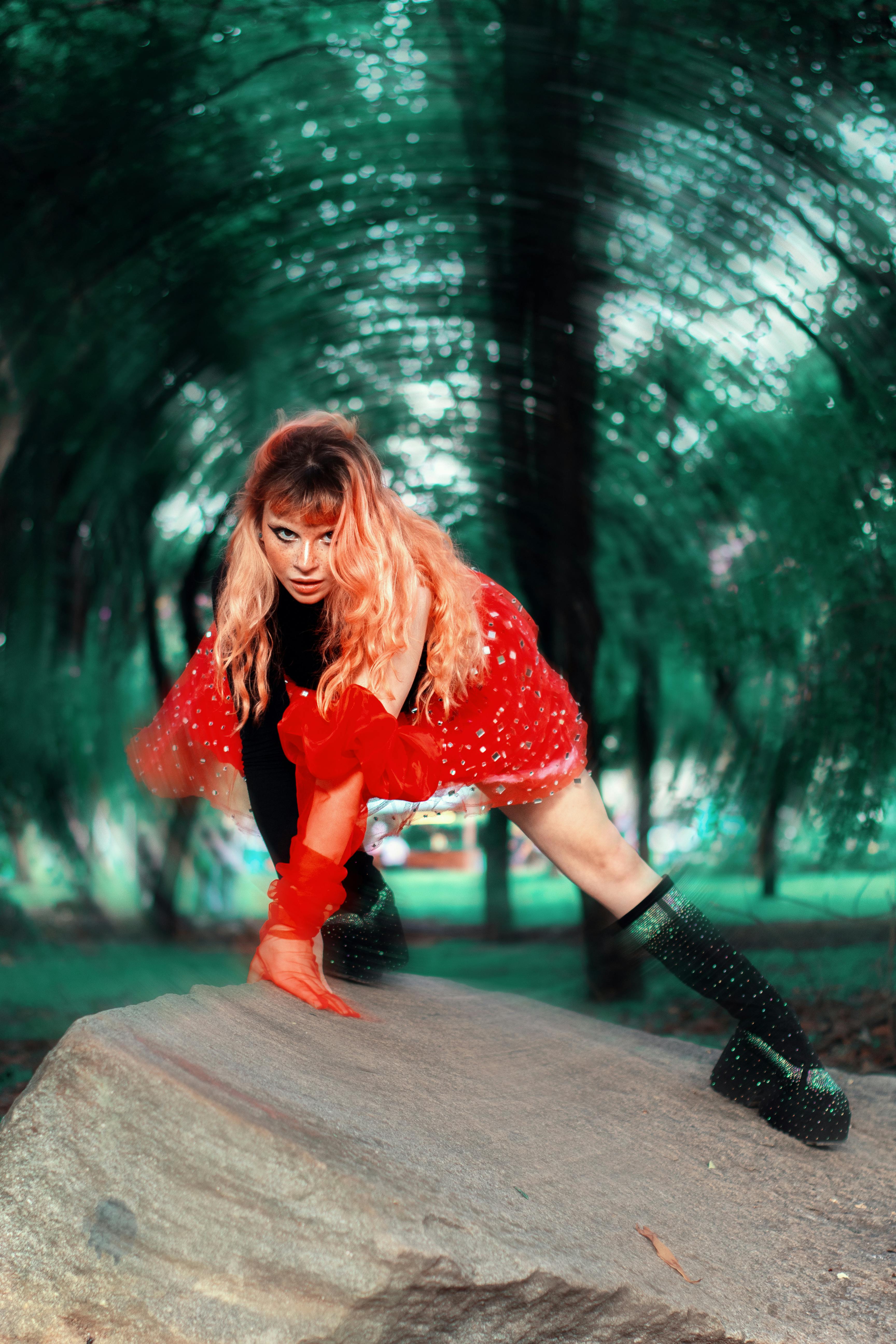 Woman Posing on Rock · Free Stock Photo