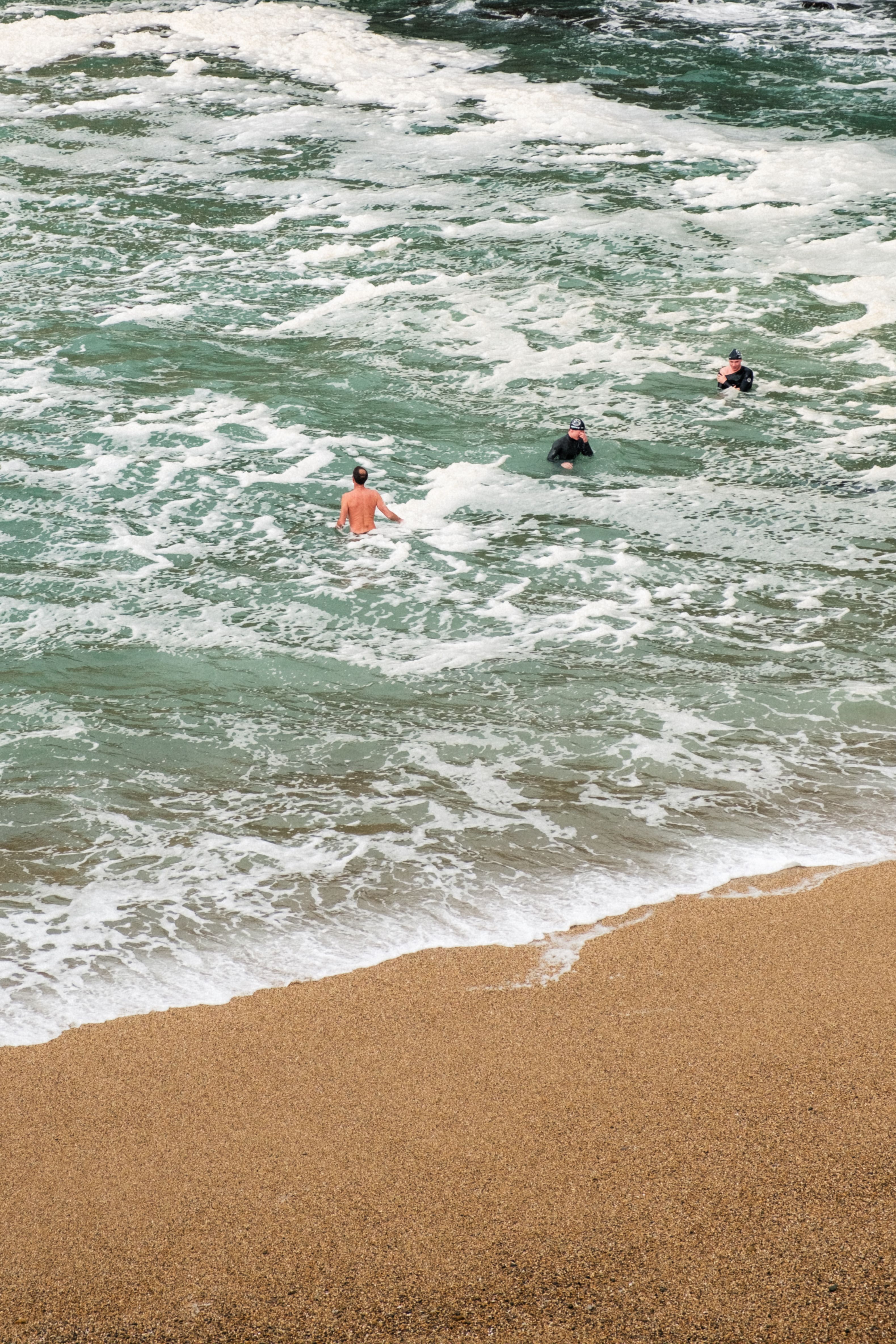 Standing People in Ocean · Free Stock Photo
