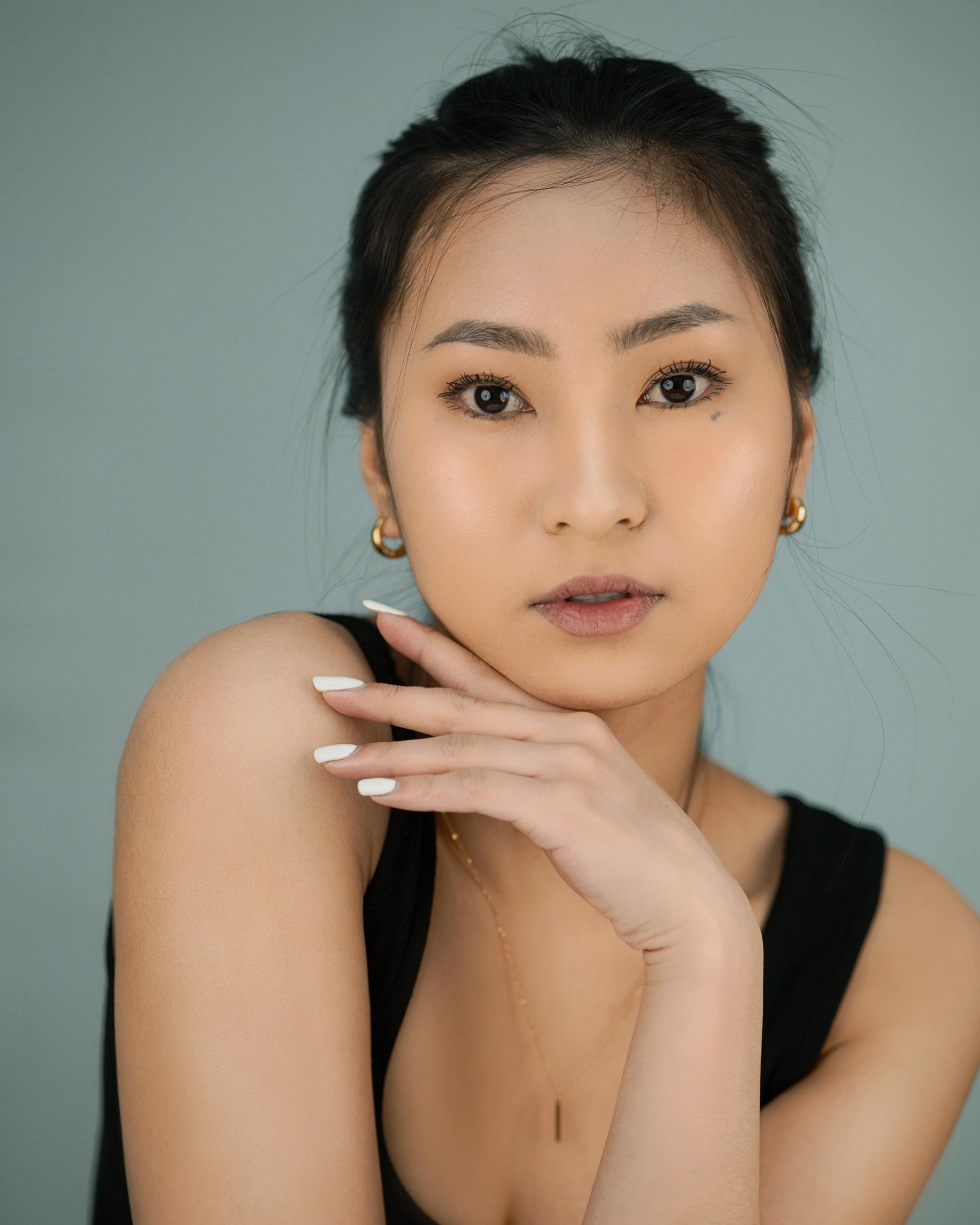 Woman Wearing Black Spaghetti Strap Top · Free Stock Photo