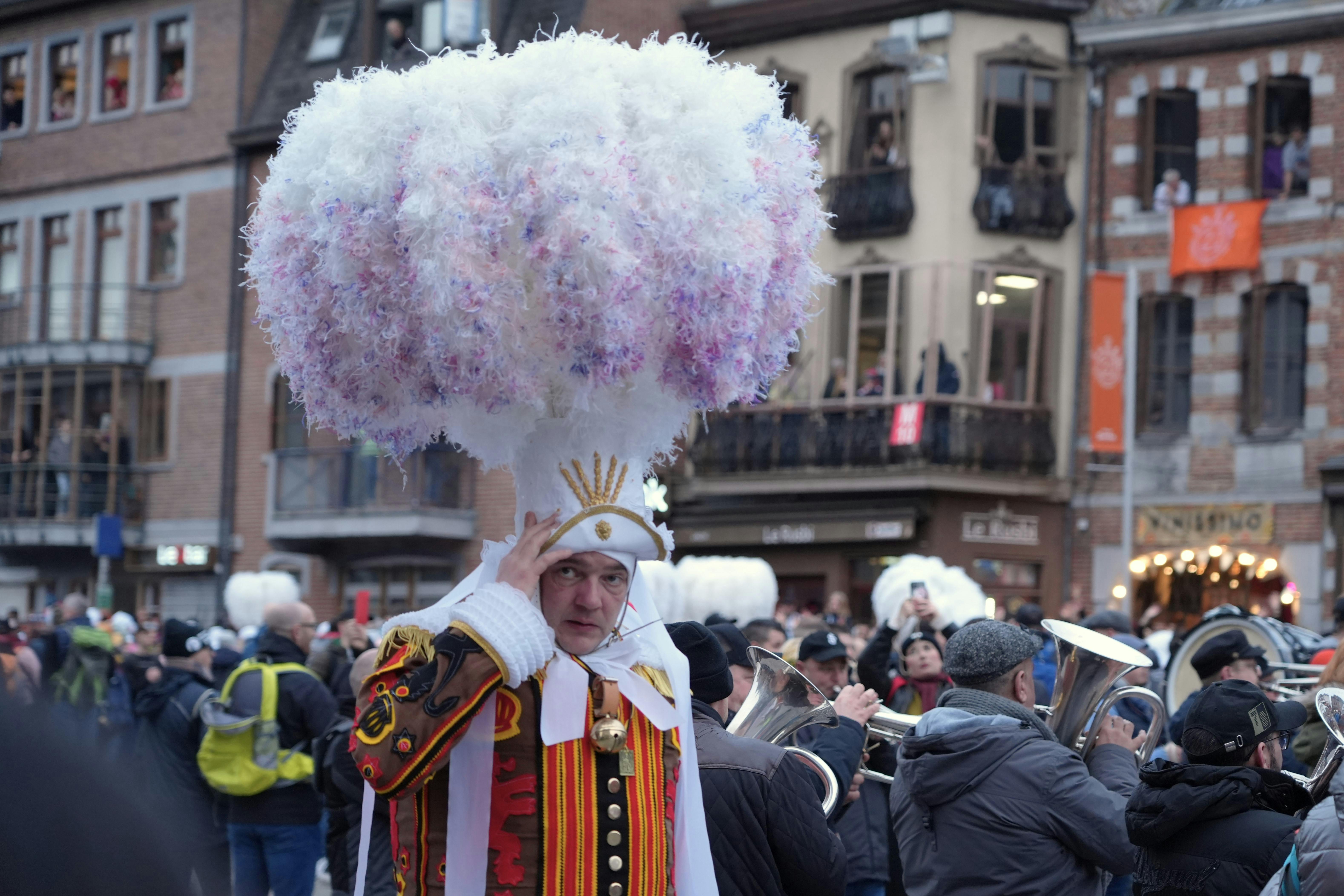 Man Wearing Traditional Costume on a Parade · Free Stock Photo