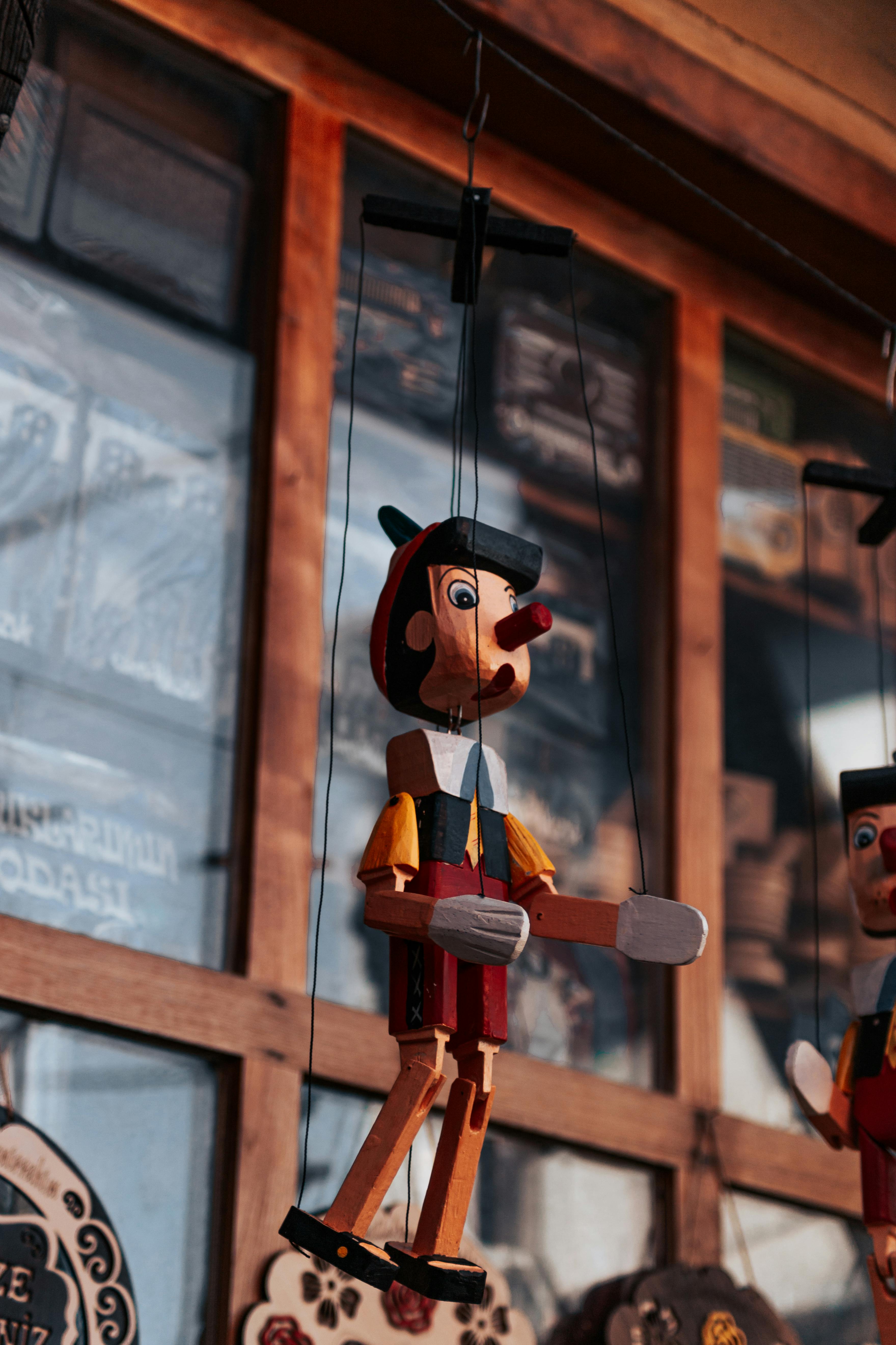 Close-up of a Pinocchio Wooden Puppet · Free Stock Photo