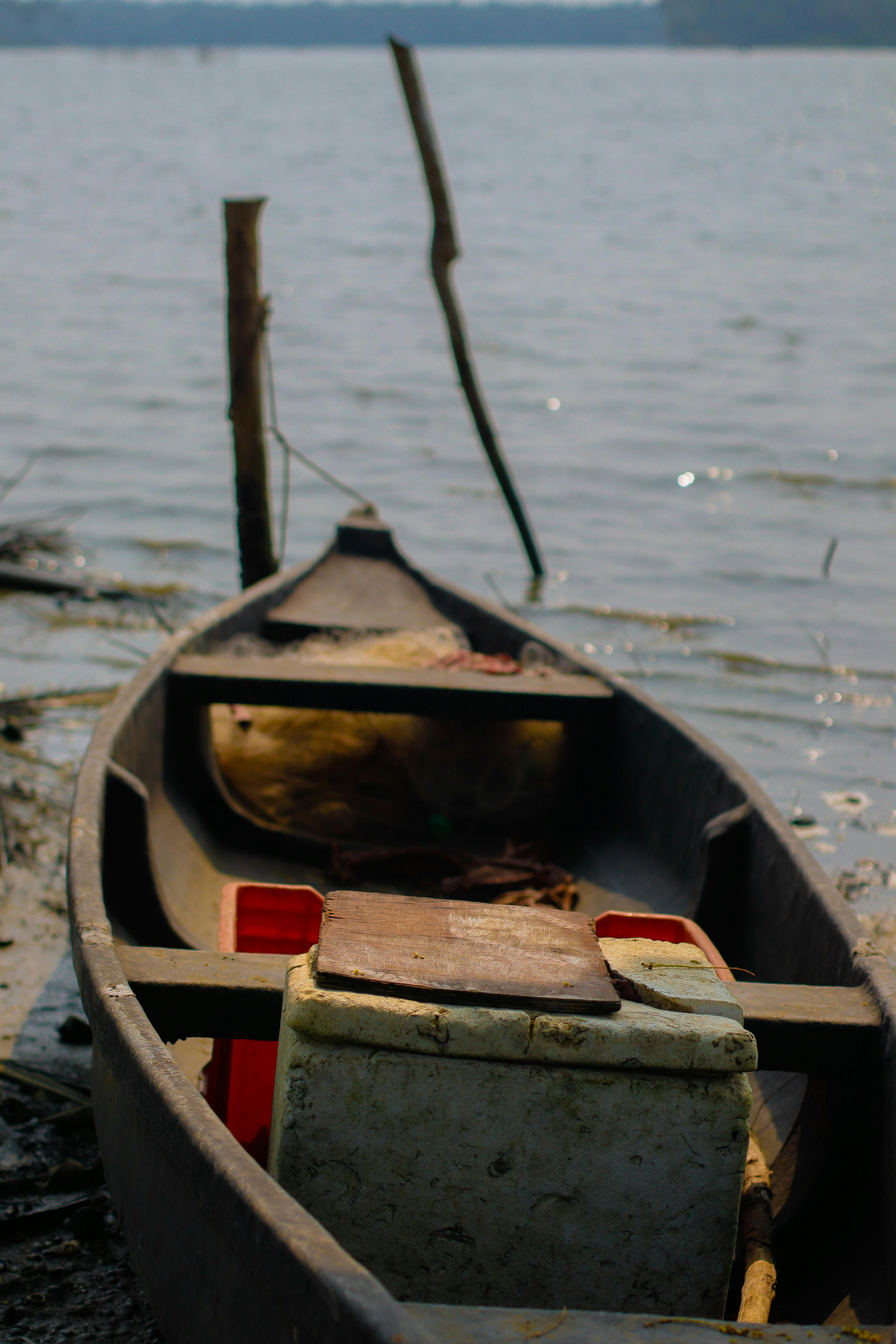 A Small Empty Boat Moored on the Shore · Free Stock Photo