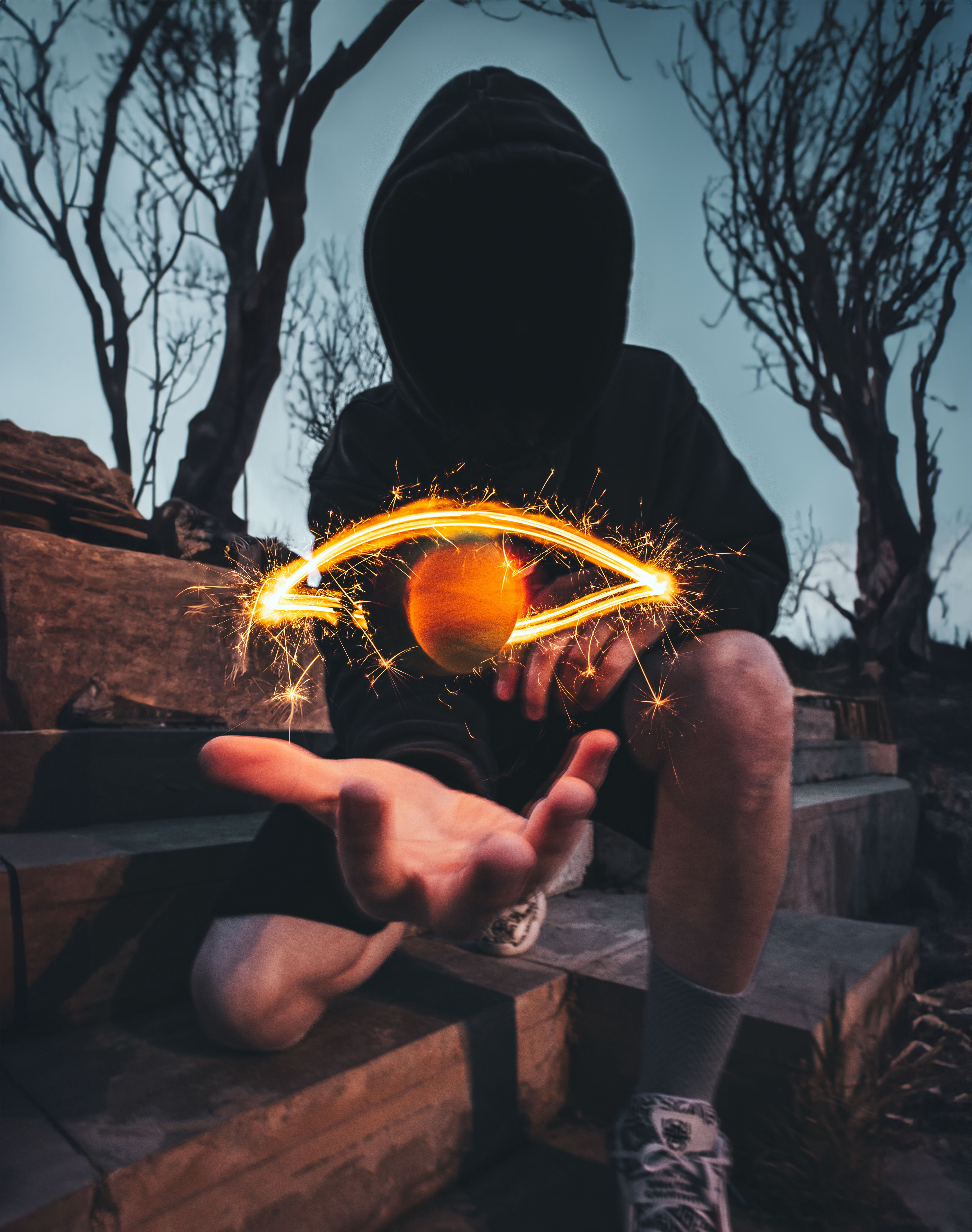 Faceless Hooded Magician Doing Tricks in the Old Cemetery · Free Stock ...