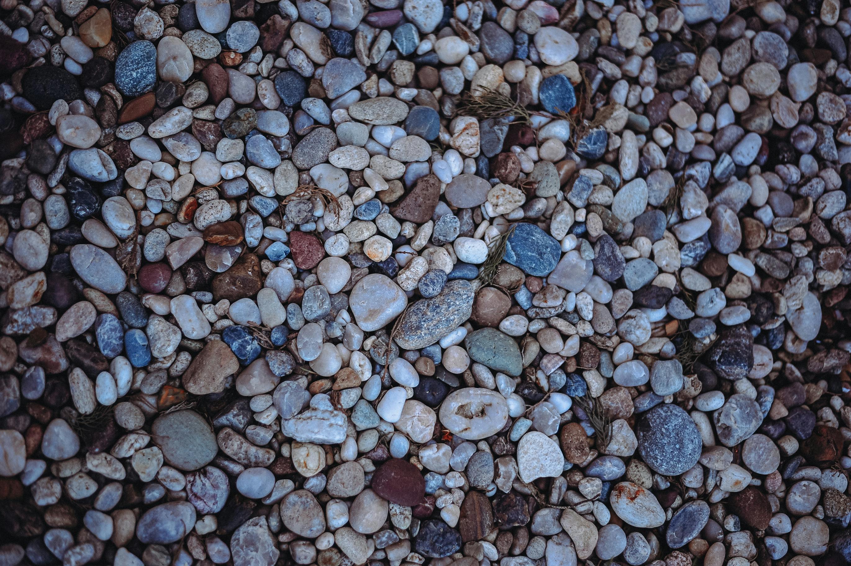 Close-up of Pebbles on the Ground · Free Stock Photo