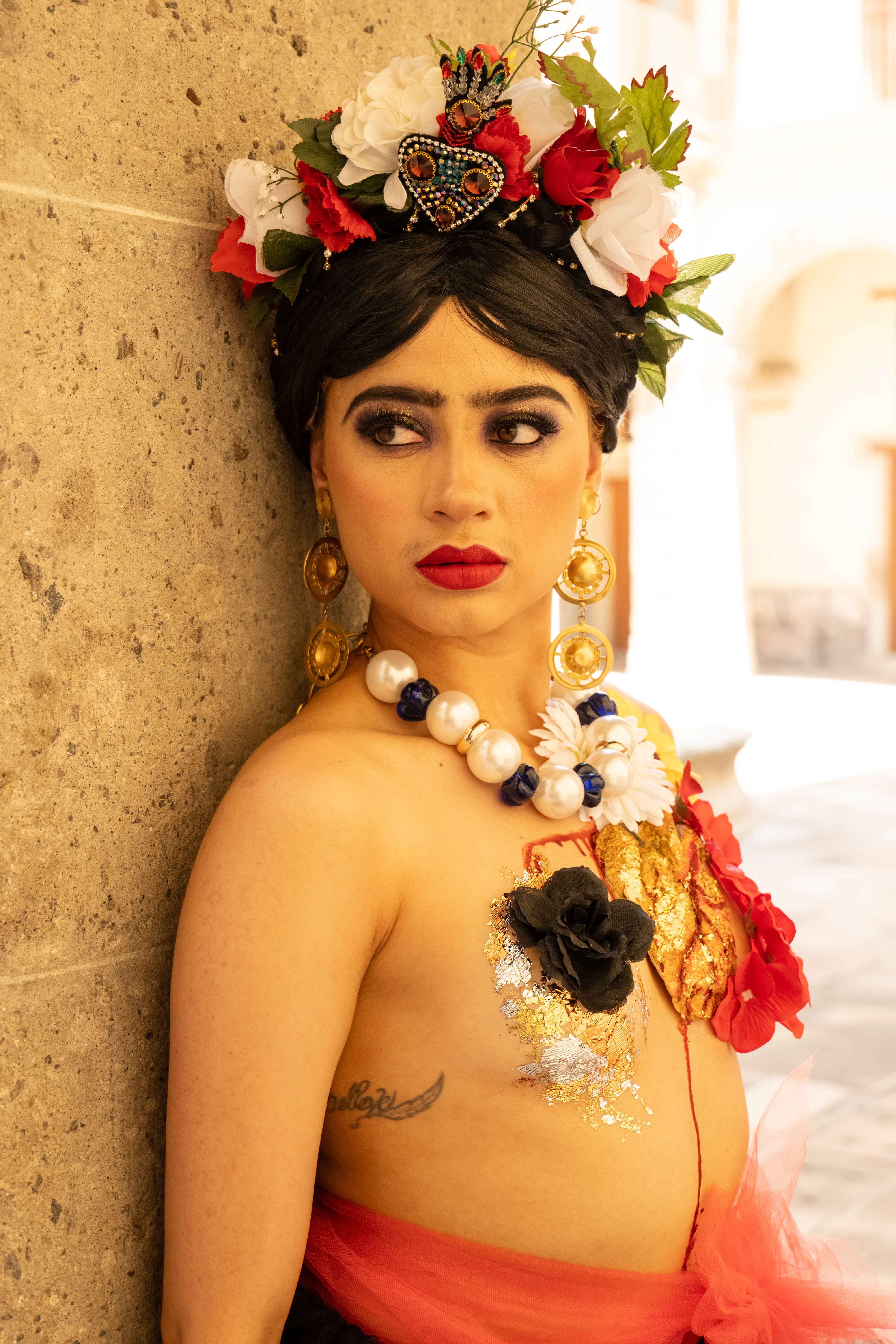 Woman in Flowers Wreath at Frida Kahlo · Free Stock Photo