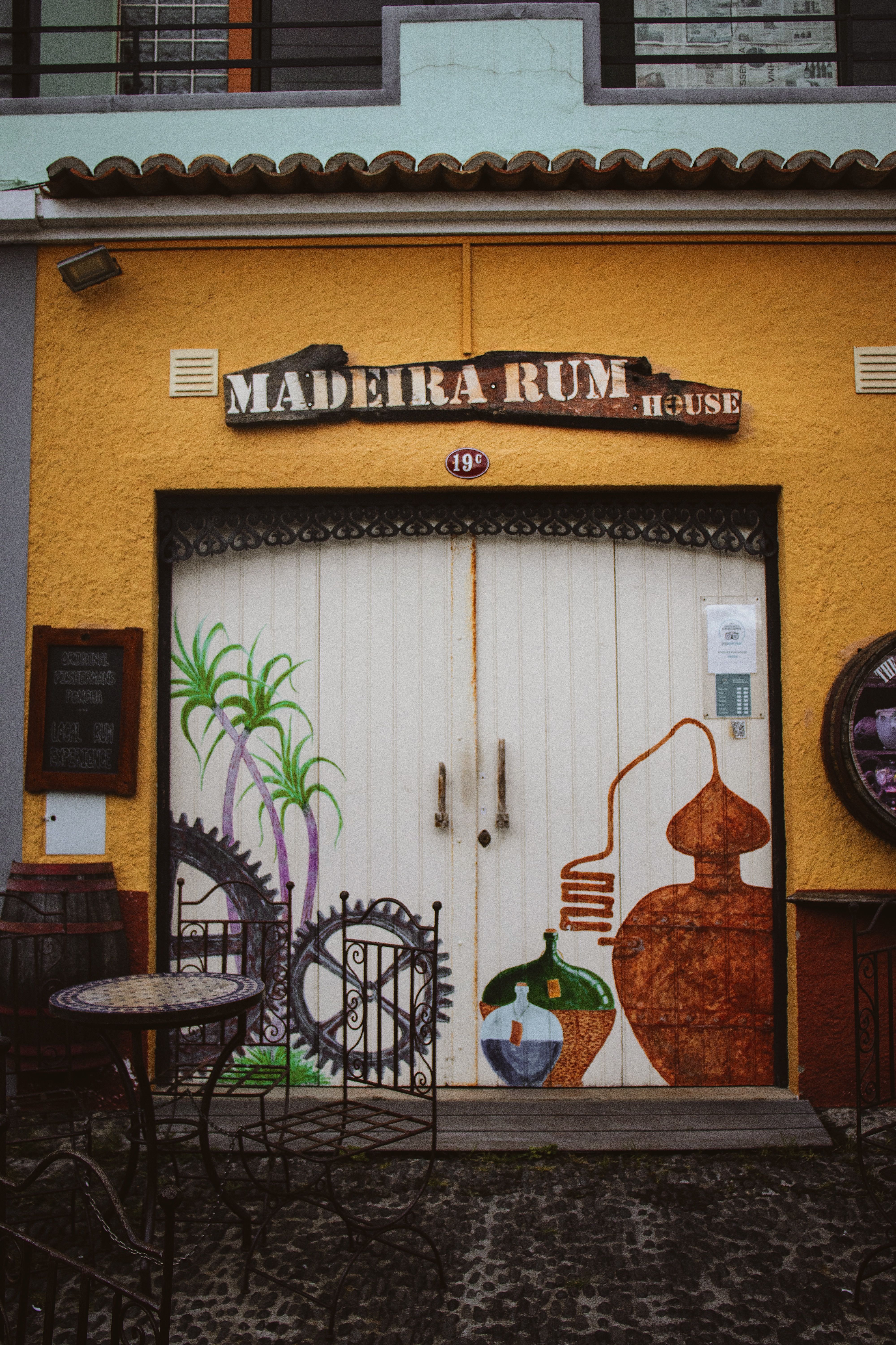 A door with a sign that says madrigal · Free Stock Photo