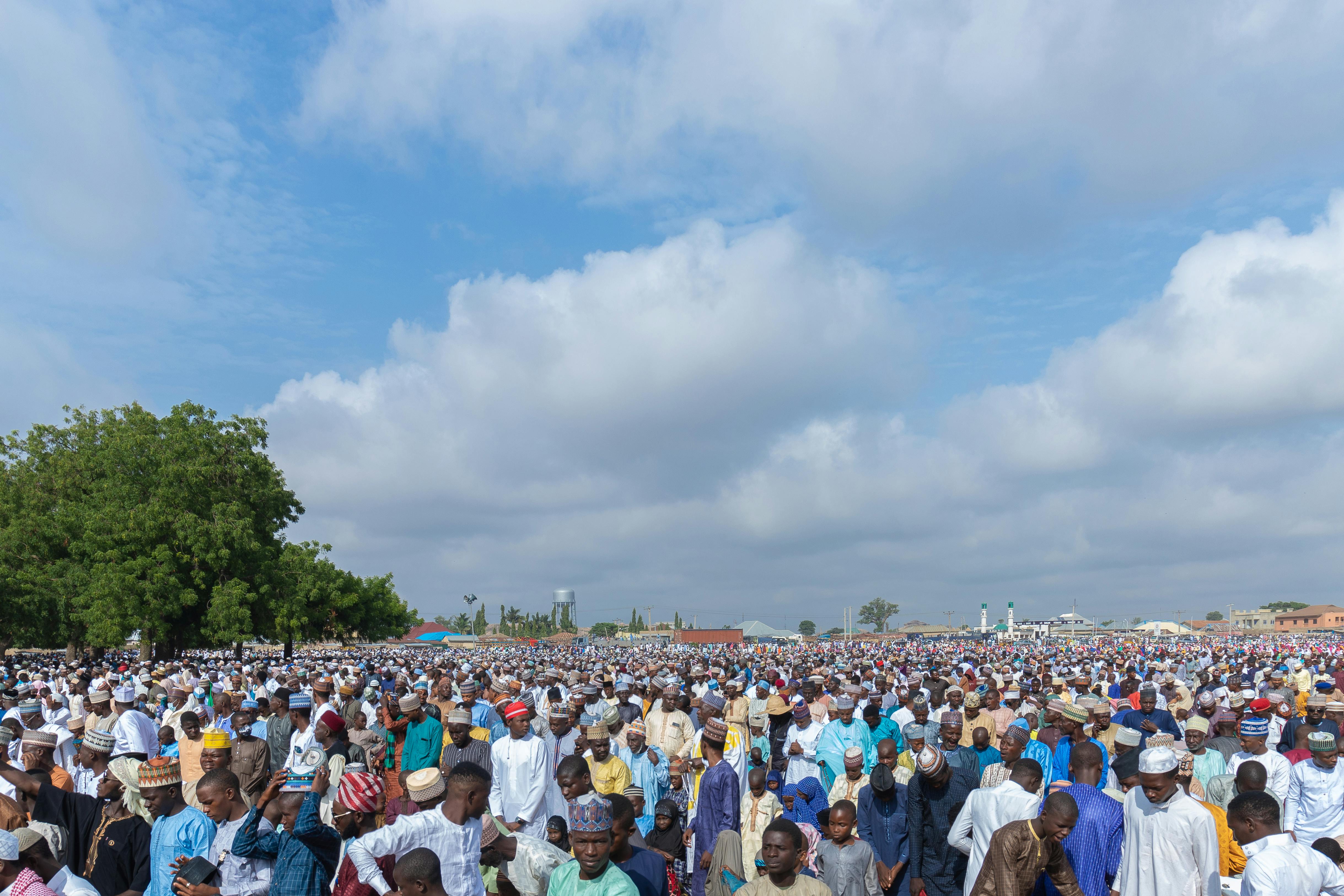 Crowd of Men Gathered for a Traditional Festival · Free Stock Photo