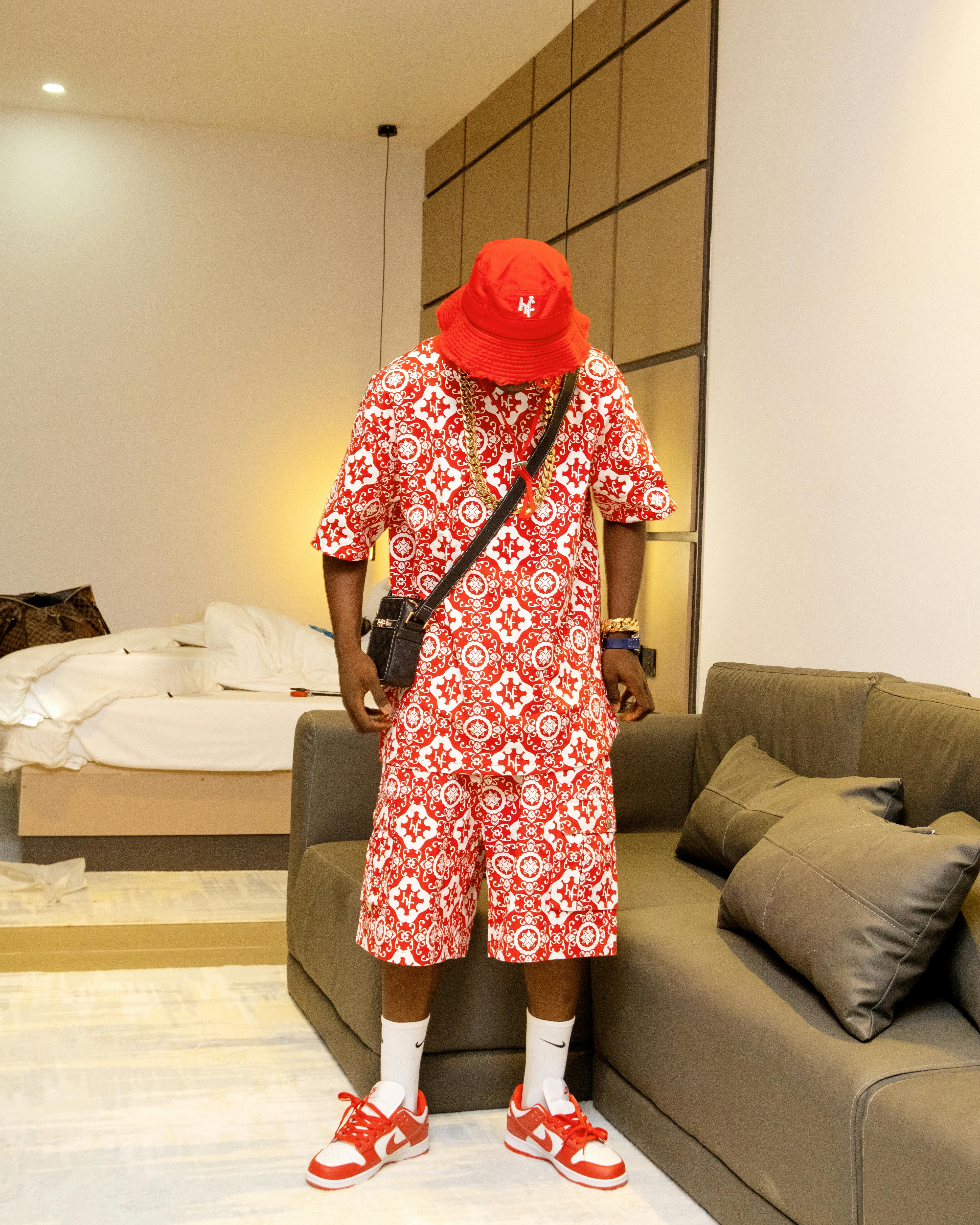 Rapper in Red Bucket Hat and T-Shirt · Free Stock Photo