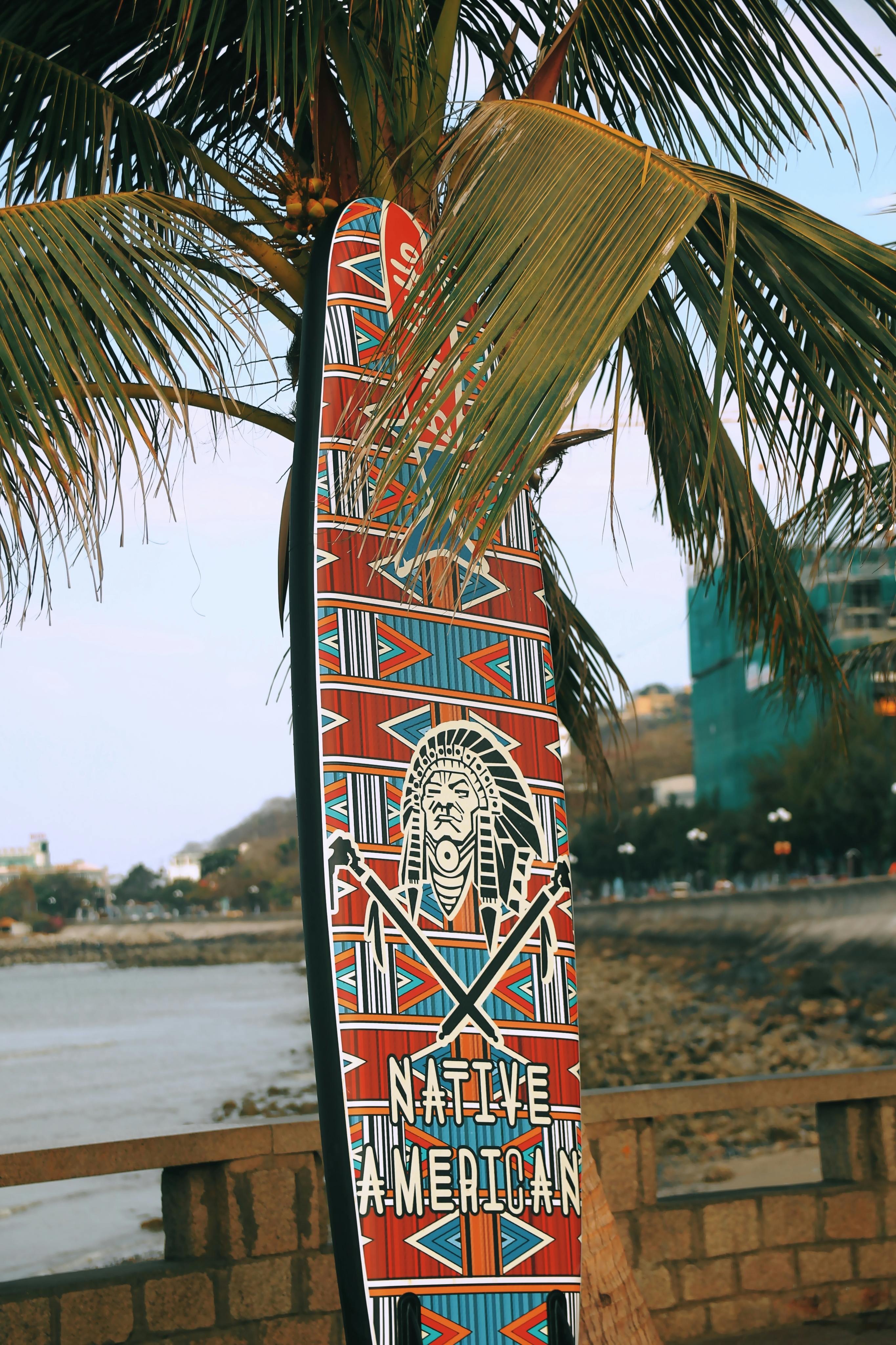 A surfboard with a native american design on it · Free Stock Photo