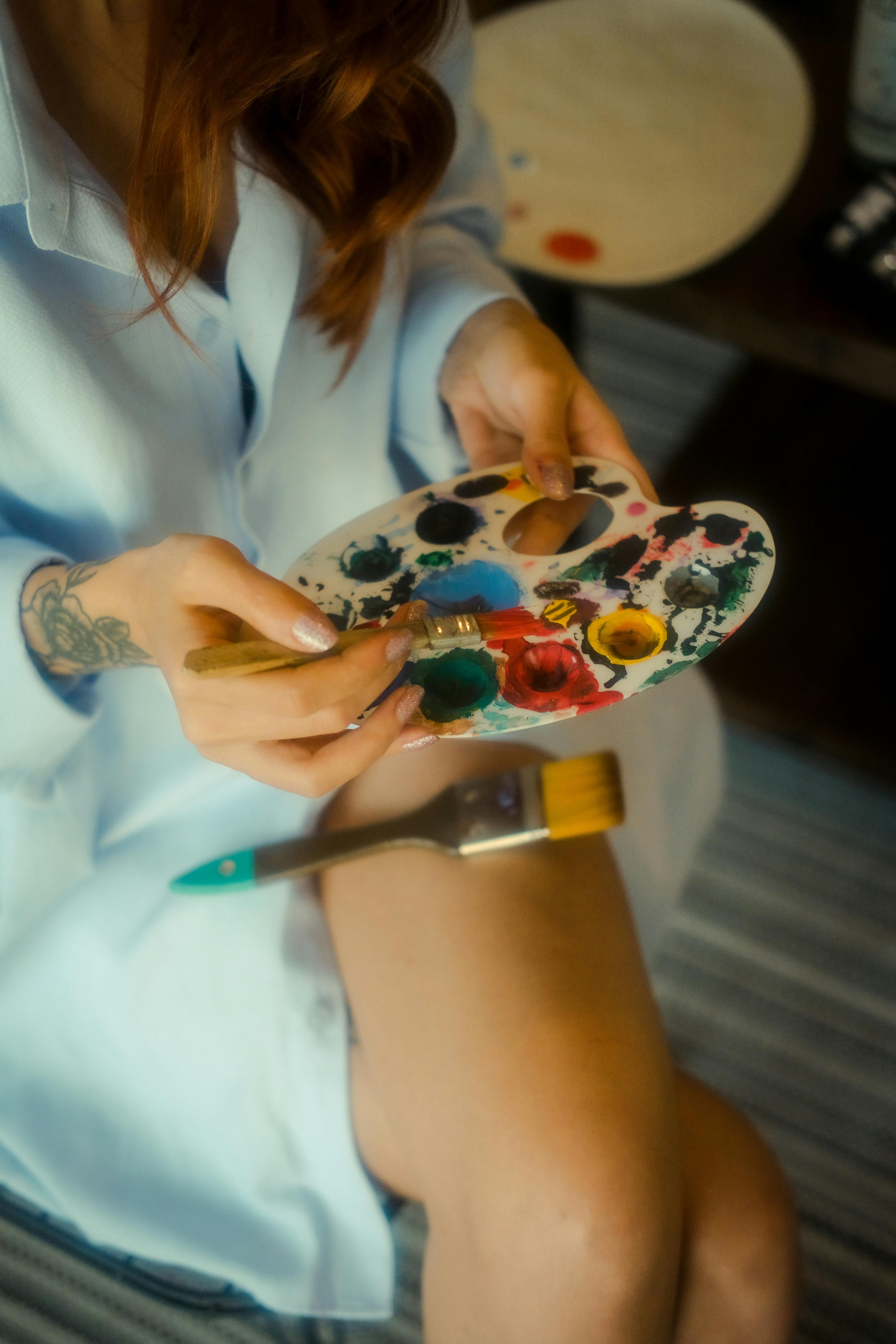 Woman Holding Color Palette · Free Stock Photo