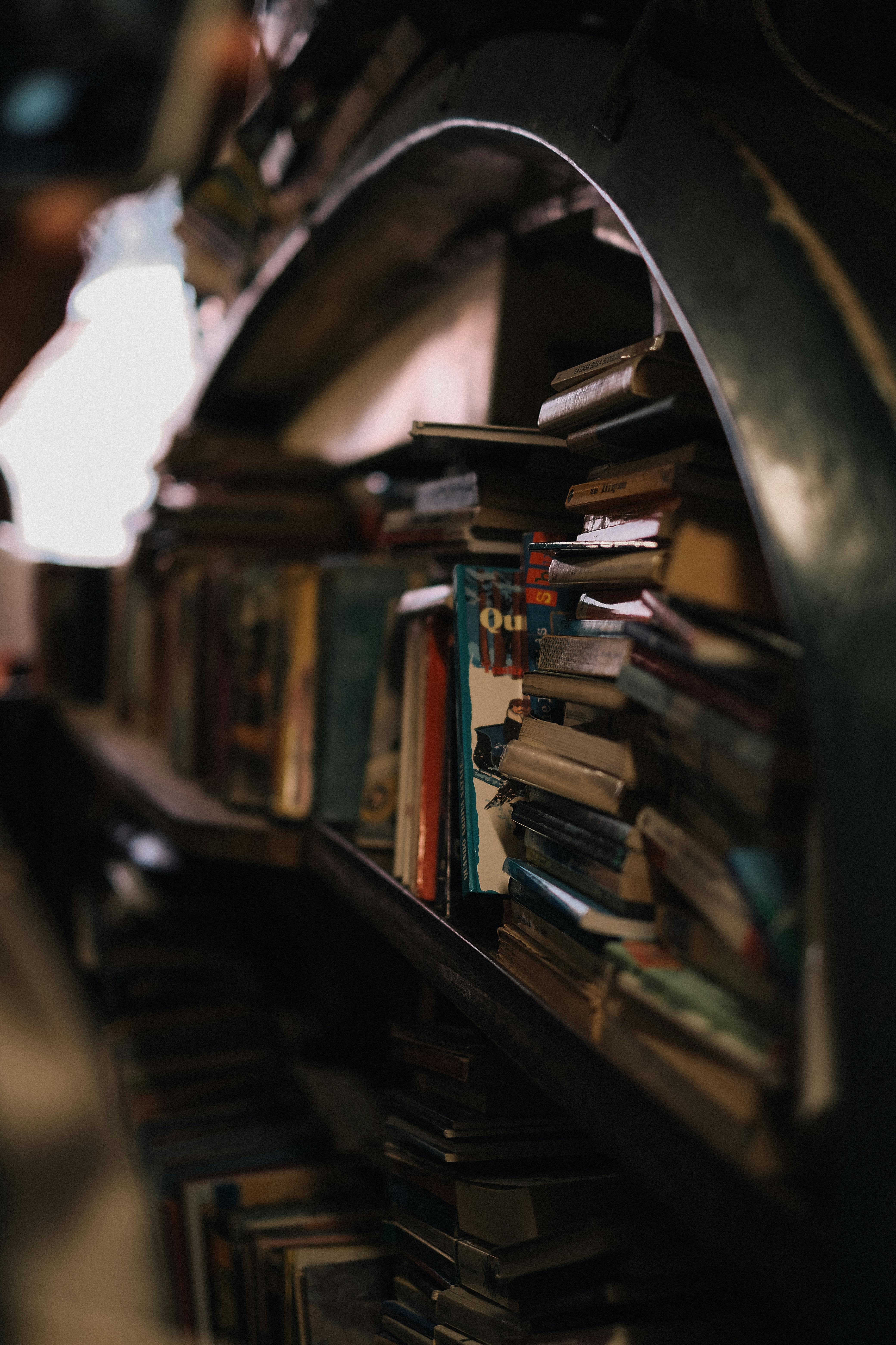 Messy Books Collection on Shelf · Free Stock Photo