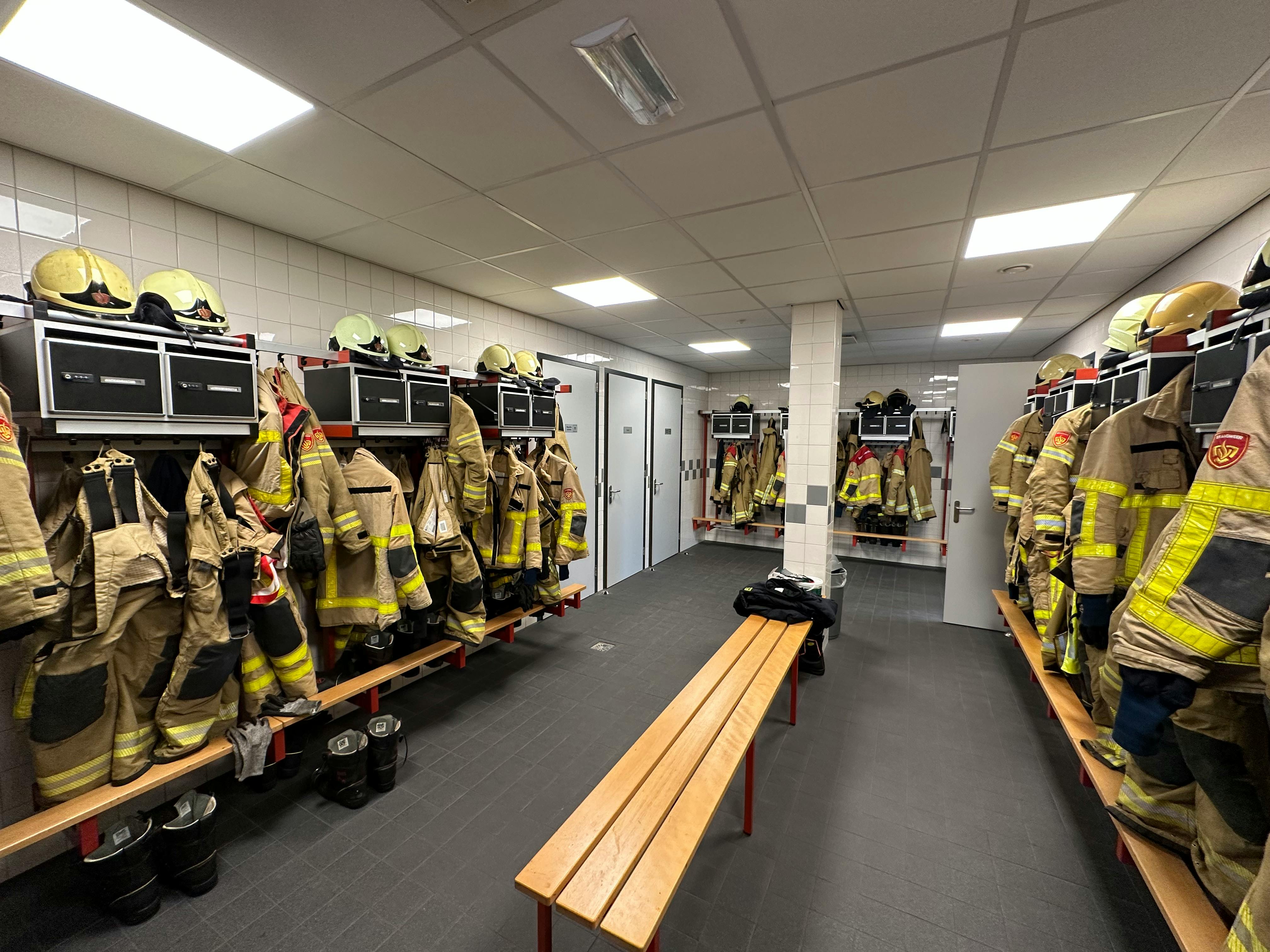 Firefighter Uniforms in Locker Room · Free Stock Photo