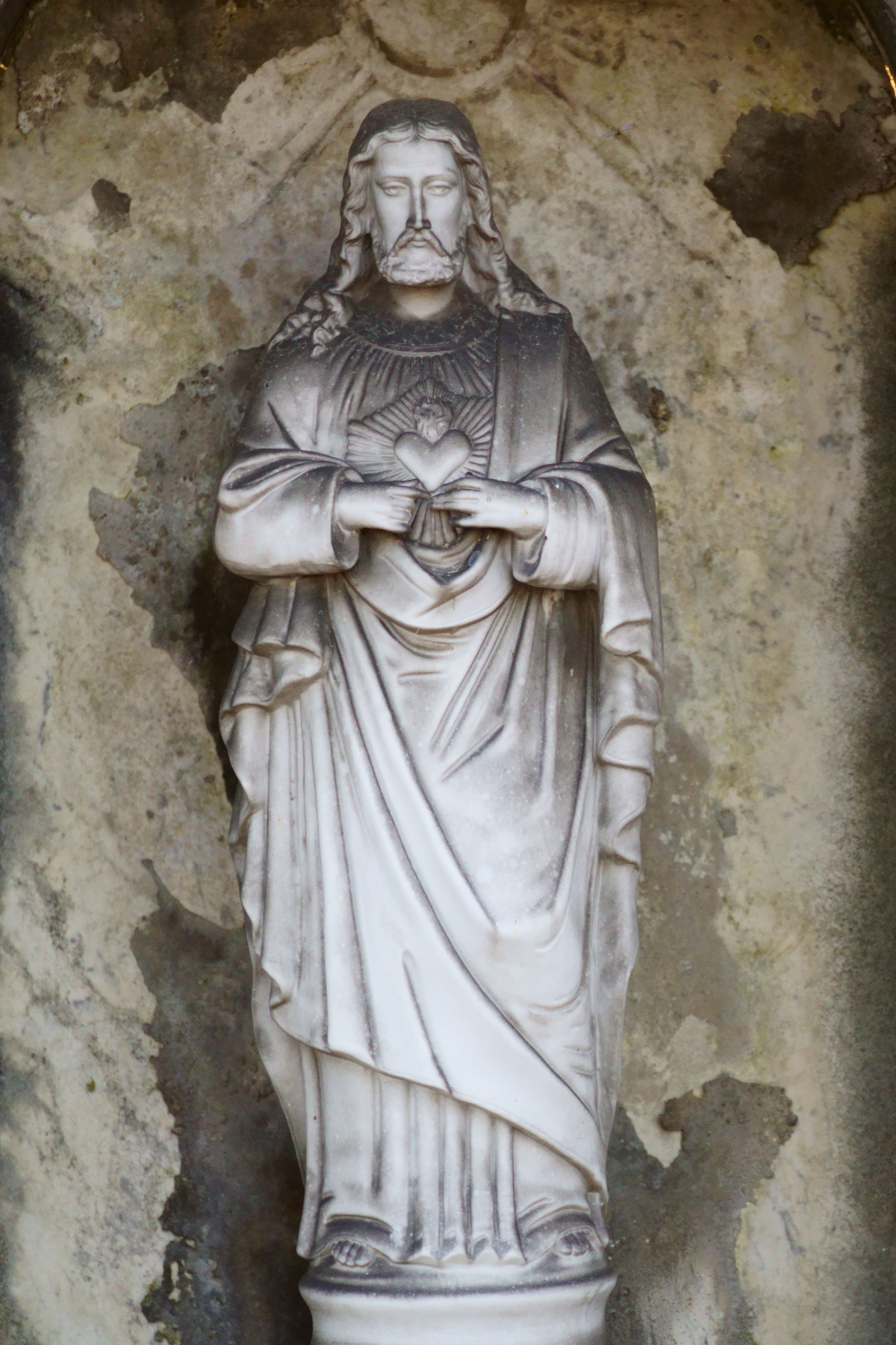 Statue of Jesus Christ by Wall · Free Stock Photo