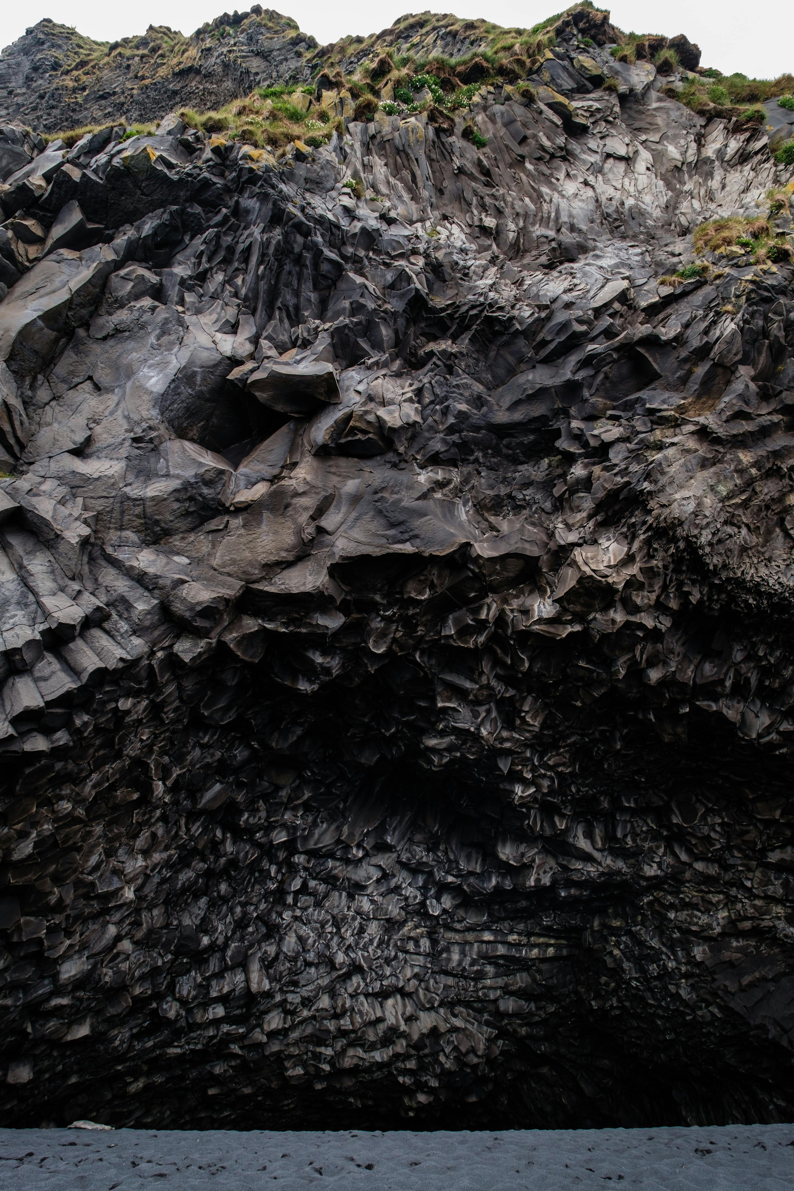 Barren Rocks on Reynisfjara Beach in Iceland · Free Stock Photo