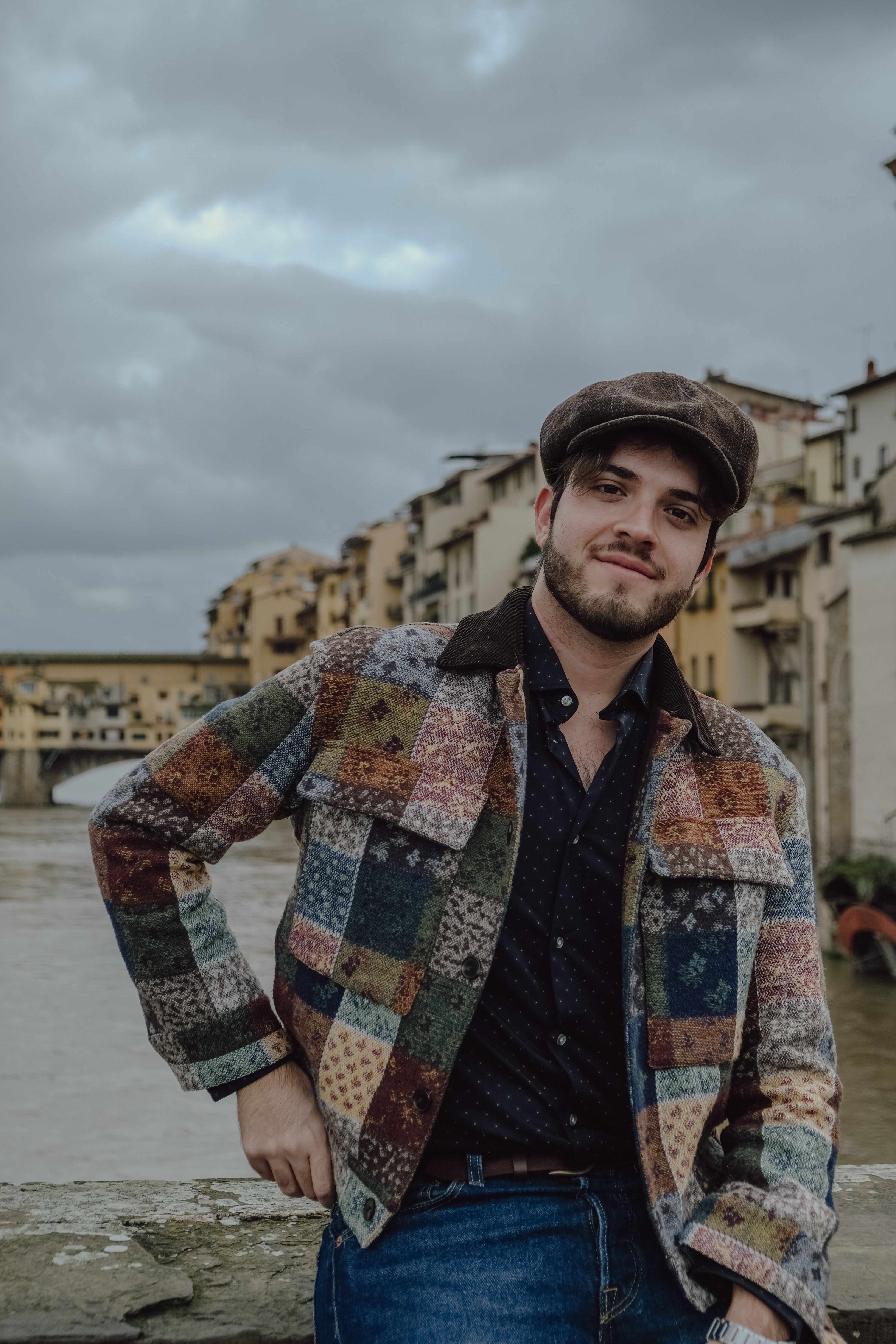 Smiling Man Wearing a Jacket · Free Stock Photo