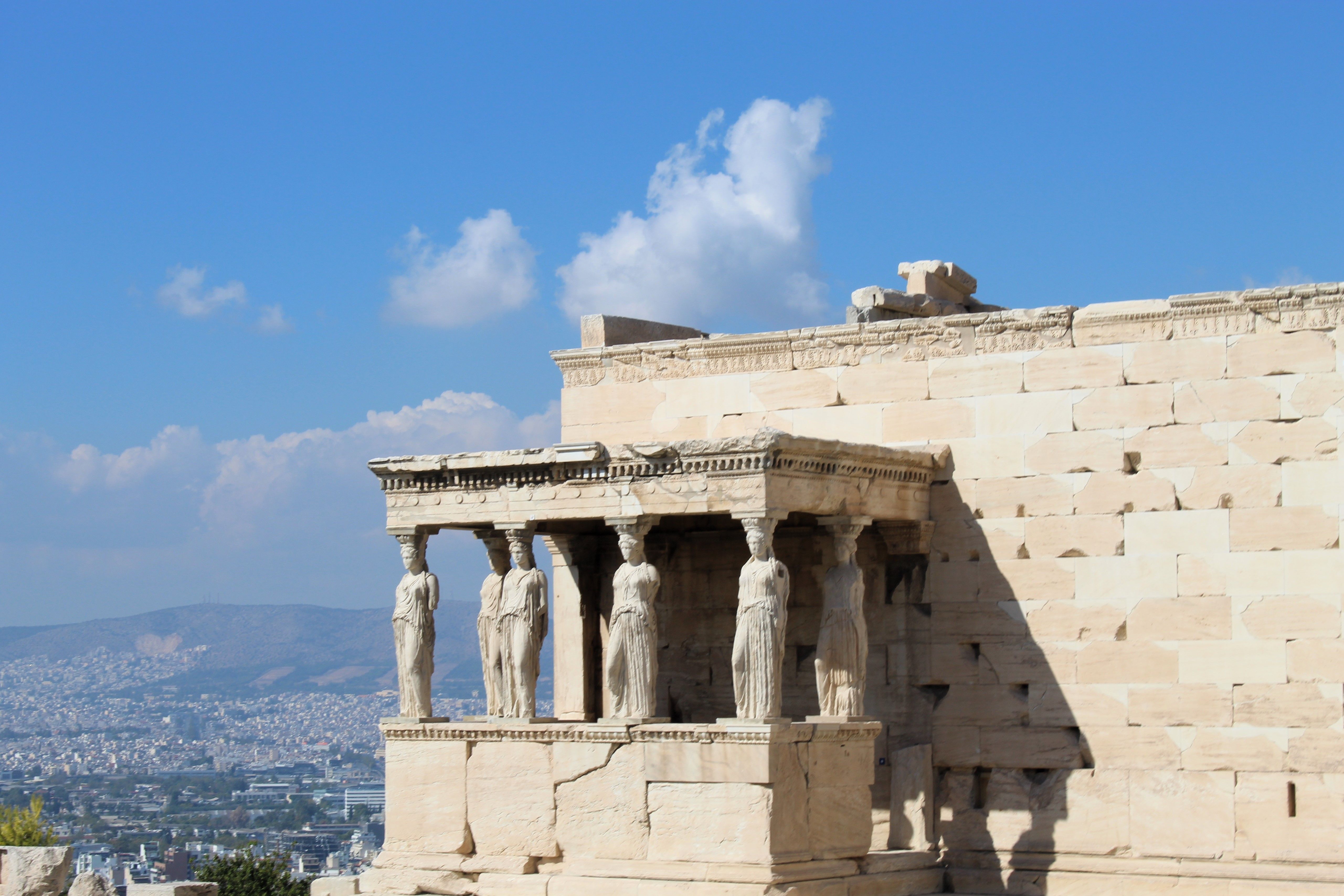 Ancient Building with Columns in Front of a Landscape of a City and ...