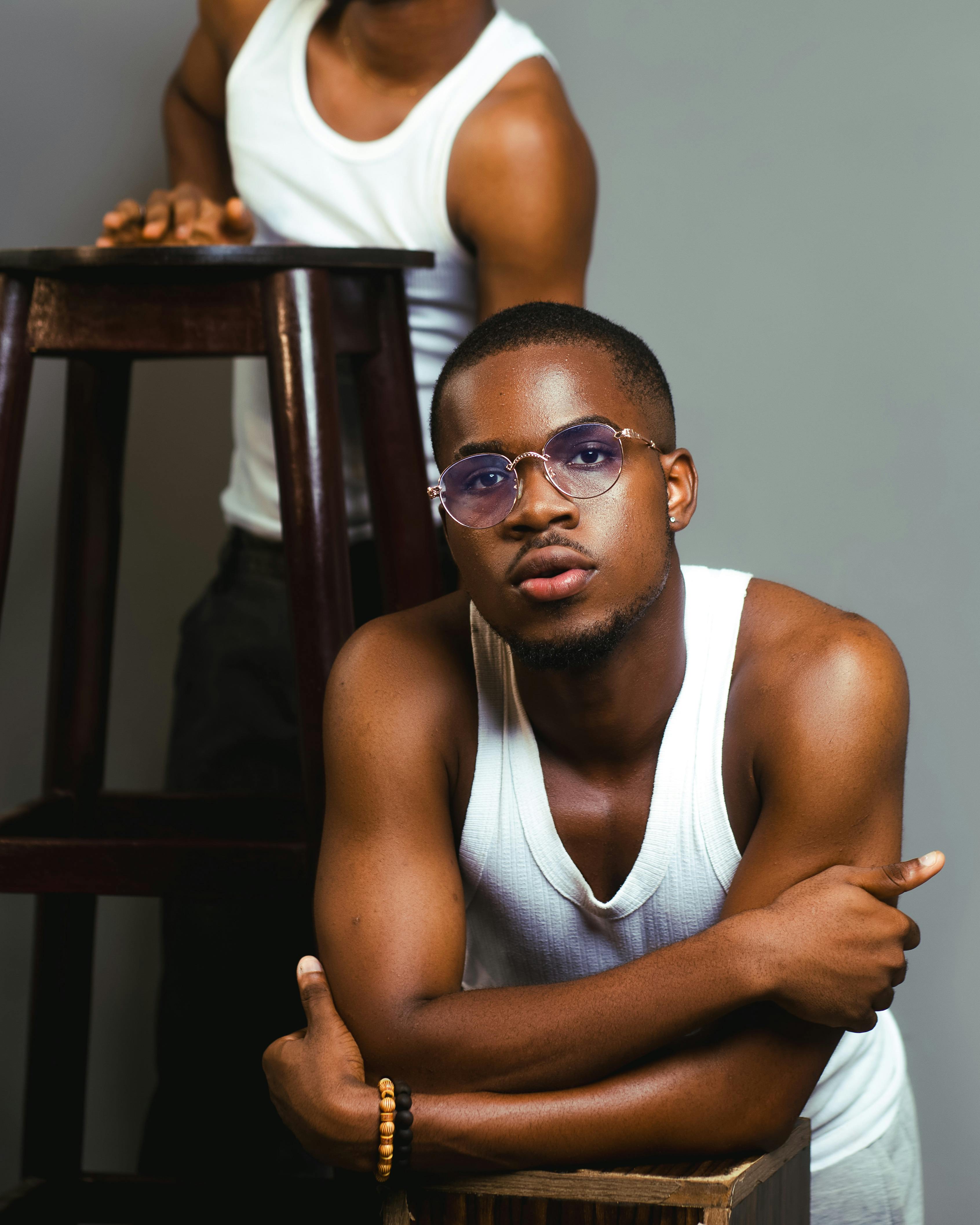 Man Wearing a Tank Top and Eyeglasses · Free Stock Photo