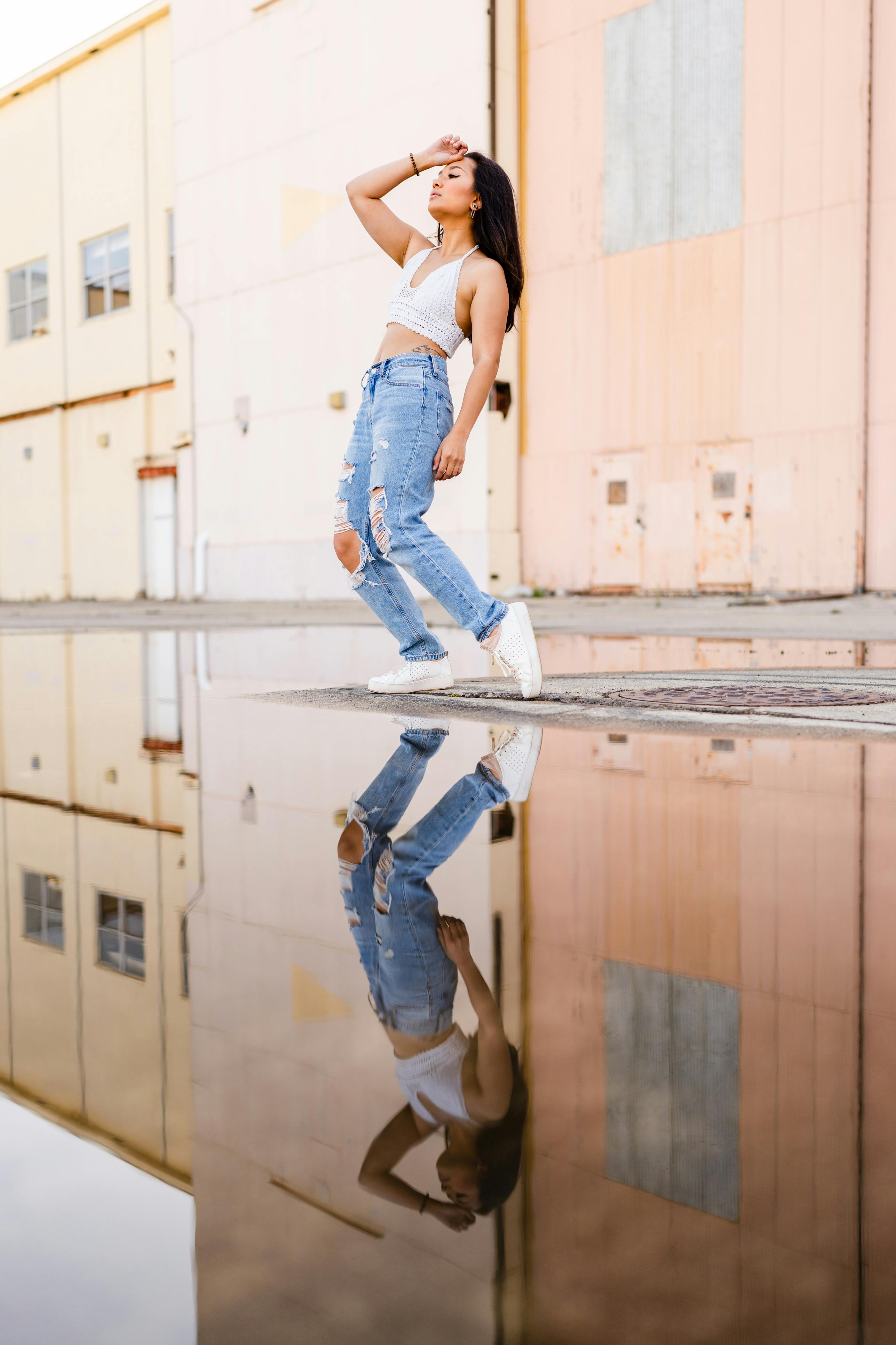 Young Pretty Brunette Woman in Casual Outfit Posing in Front of a ...